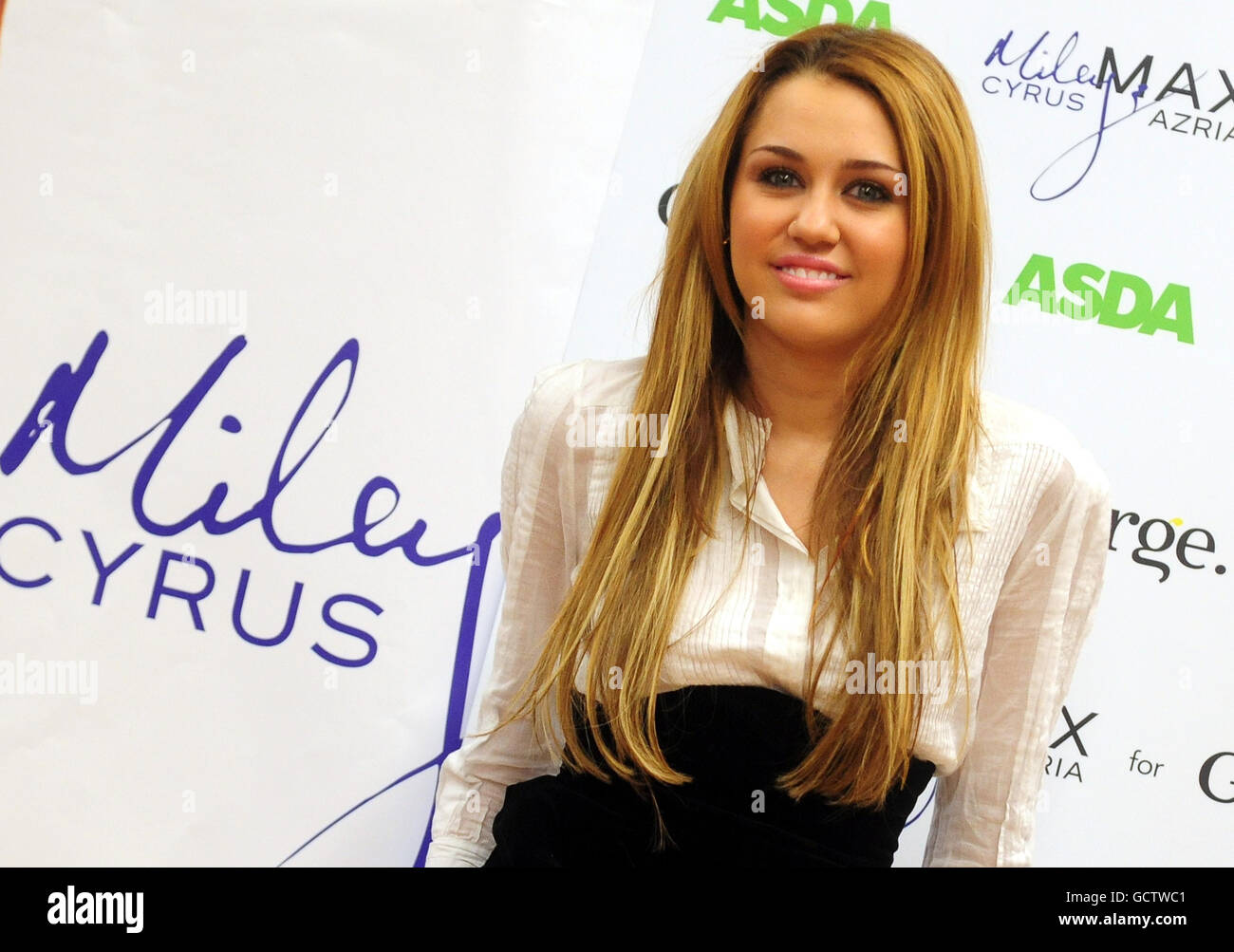 Miley cyrus at asdas spondon store in derby hi-res stock photography ...
