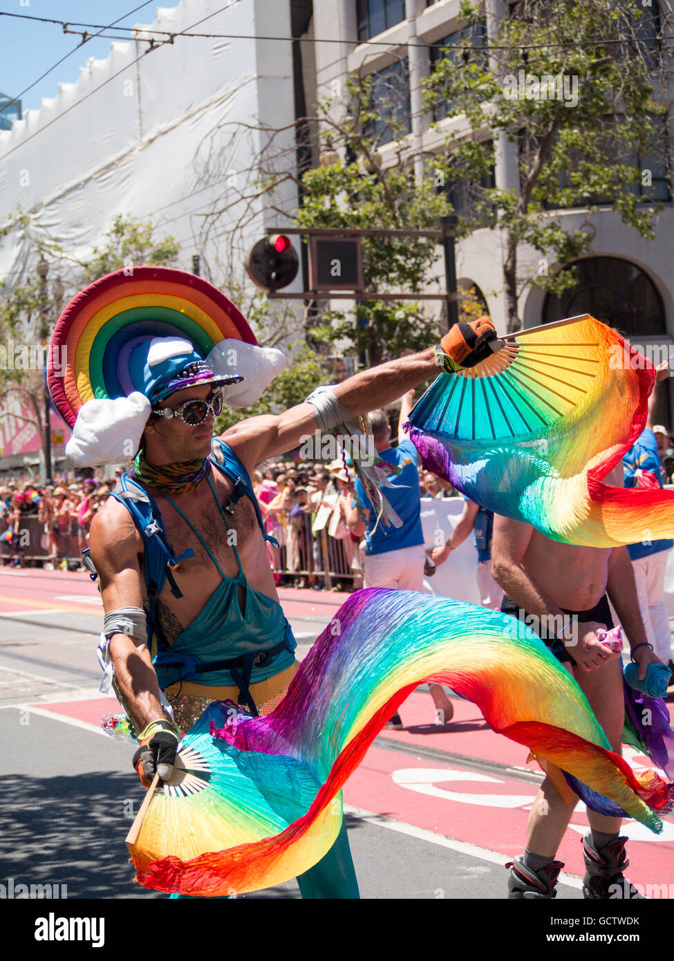 Gay man dancing in a gay pride parade hi-res stock photography and ...