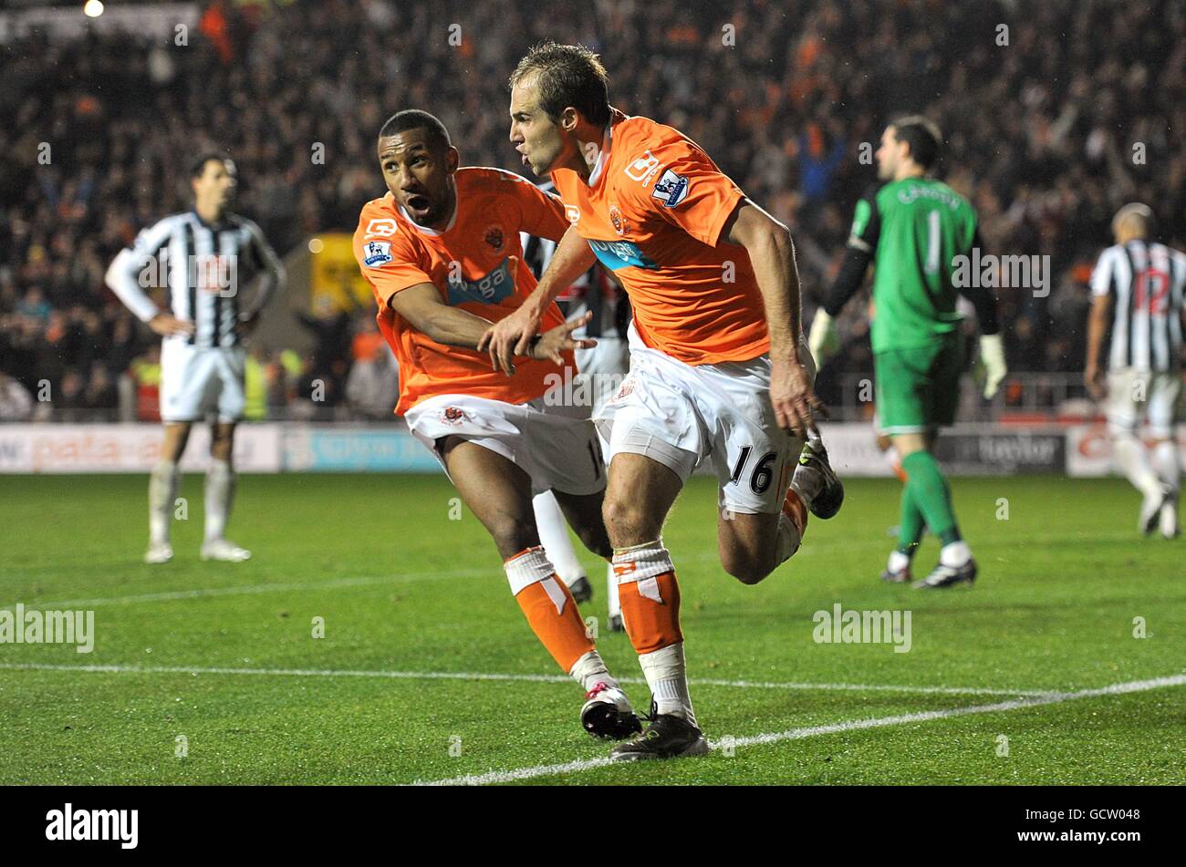 Blackpool's Luke Varney (right) celebrates with team mate Elliot ...