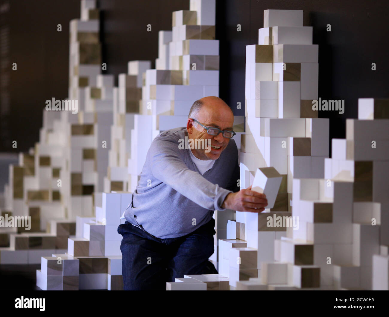 Artist Colin Booth puts the final touches to his installation called ...