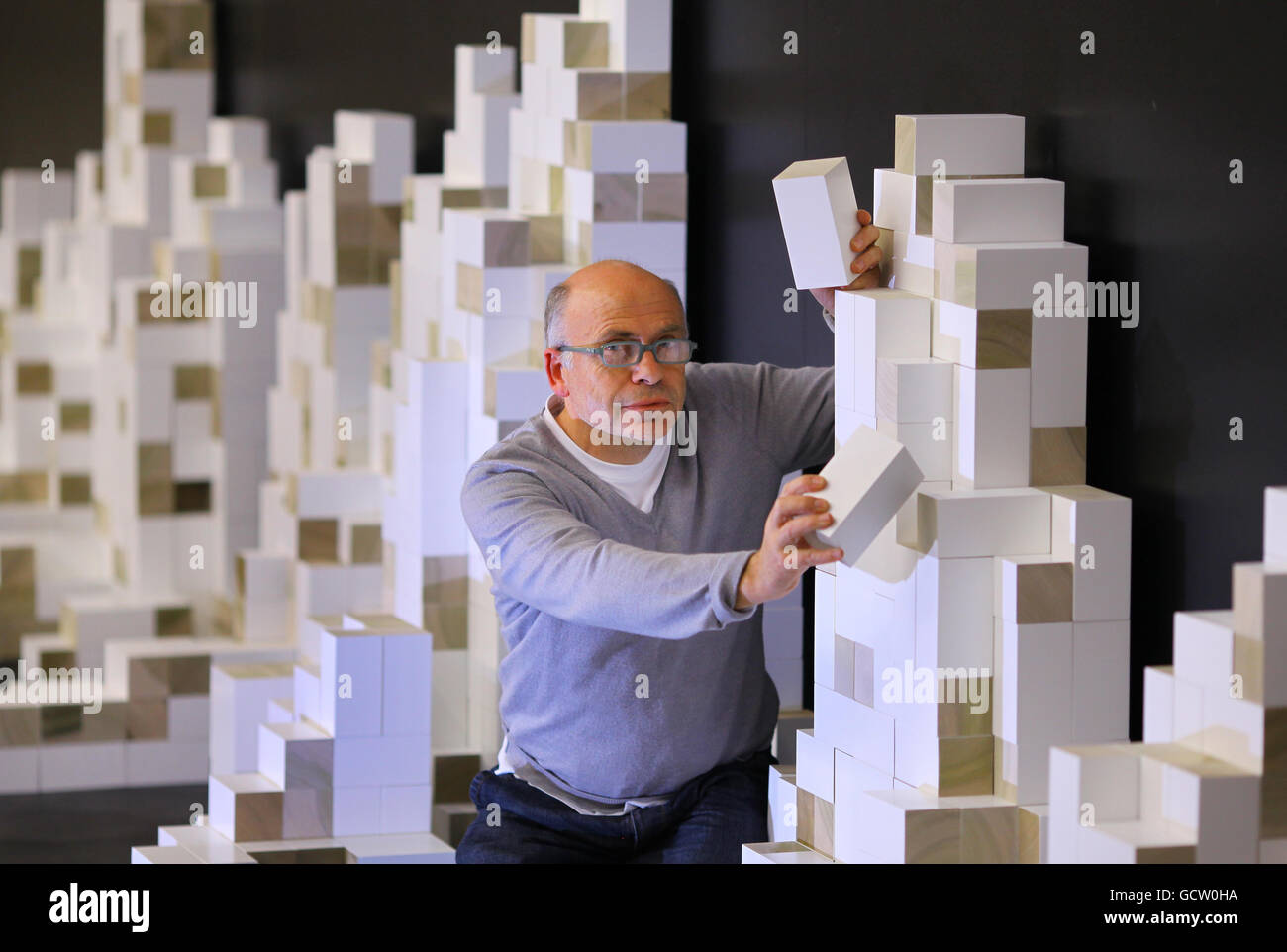 Artist Colin Booth puts the final touches to his installation called ...