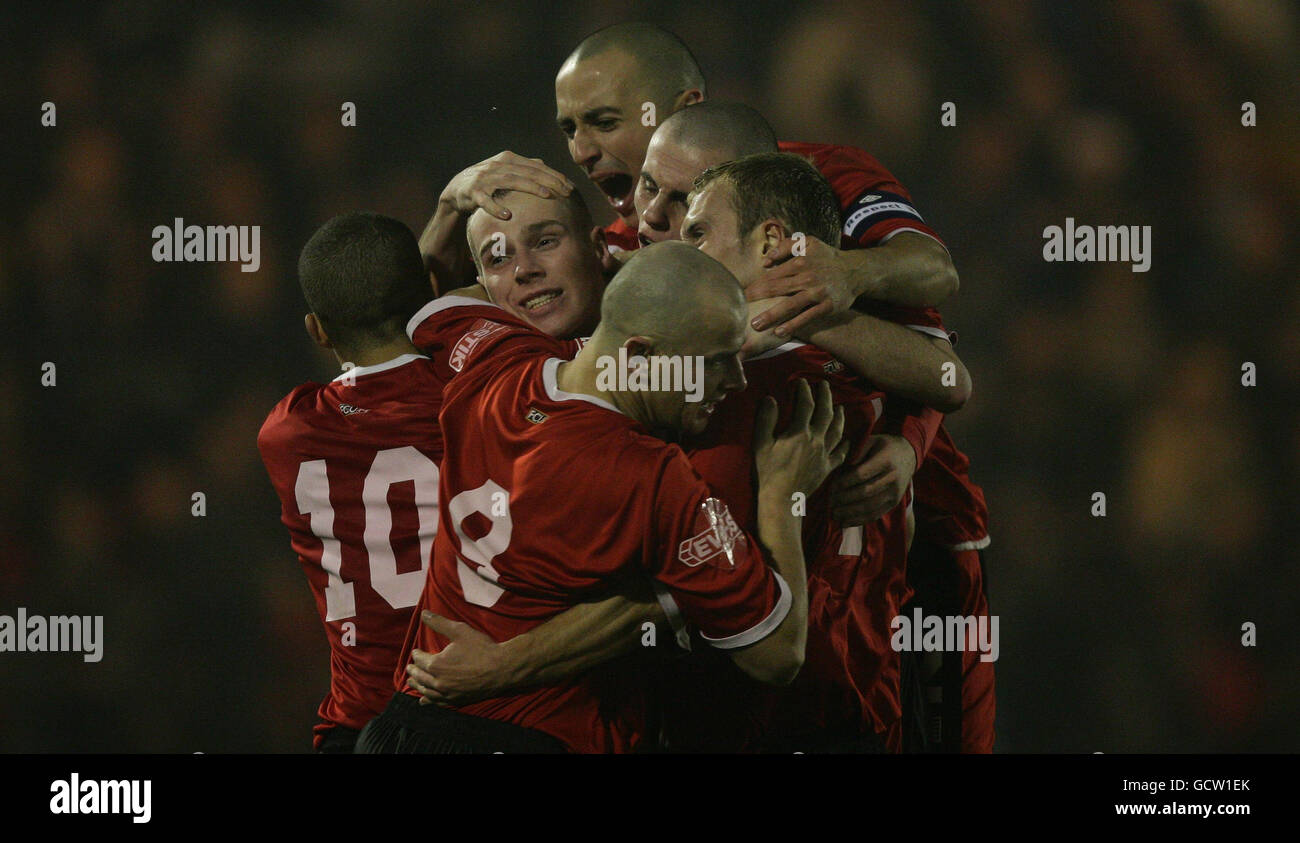 FC United of Manchester's Jake Cotterill (second left) celebrates ...