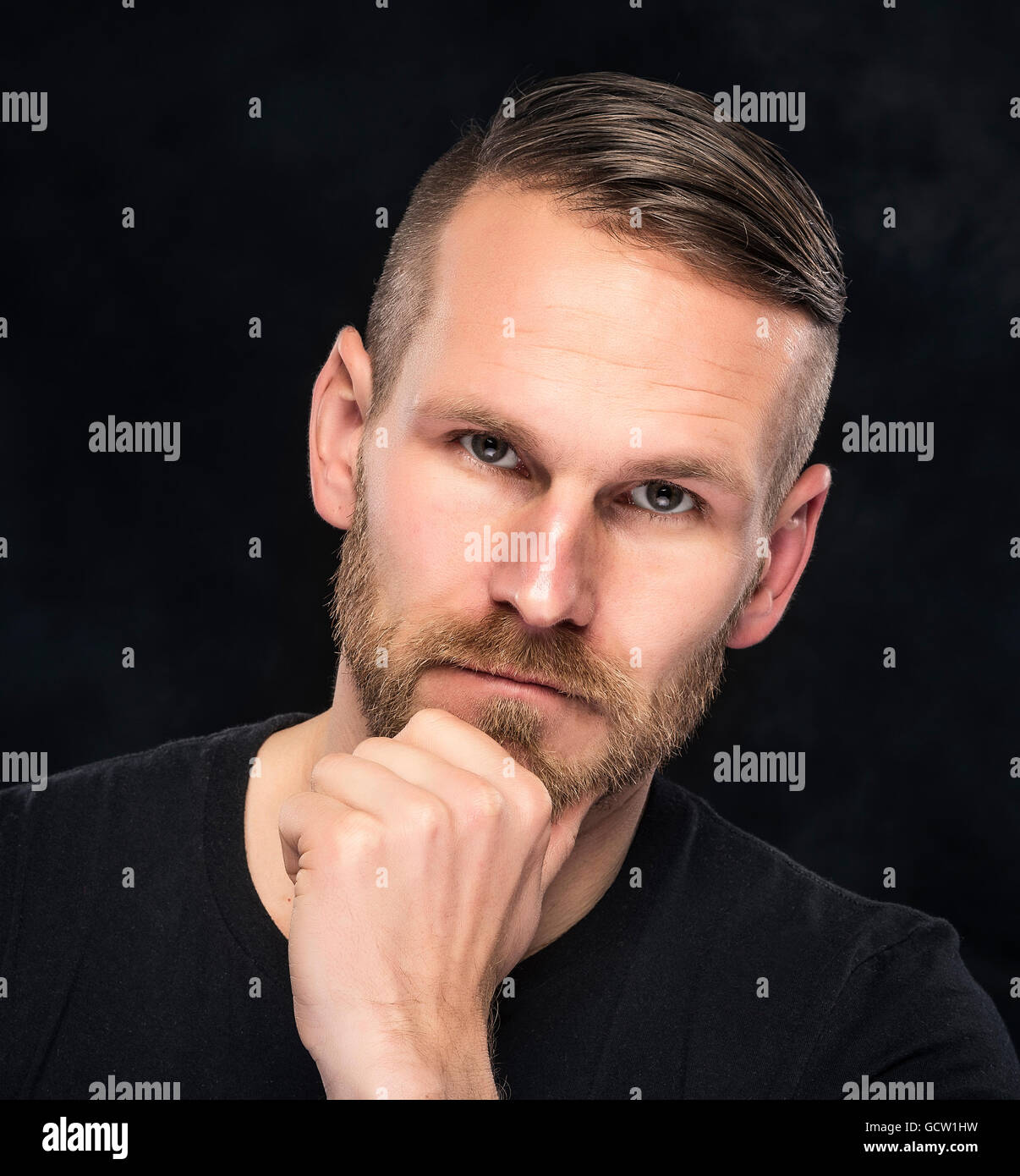 Portrait of an handsome gent man on dark background Stock Photo - Alamy