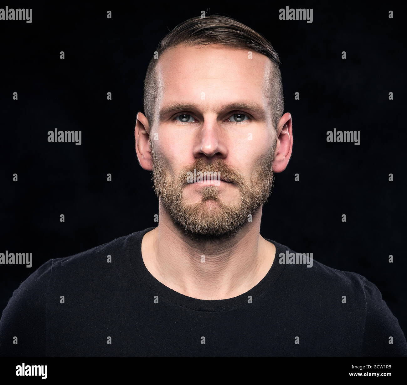 Portrait of an handsome gent man on dark background Stock Photo - Alamy