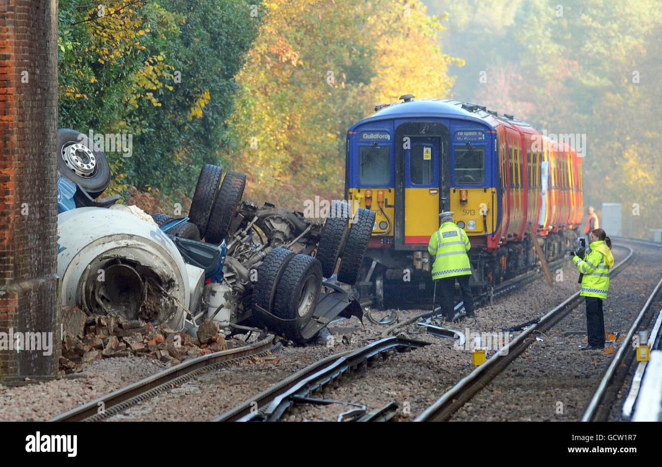General view of a lorry laying on the train track close to Oxshott ...