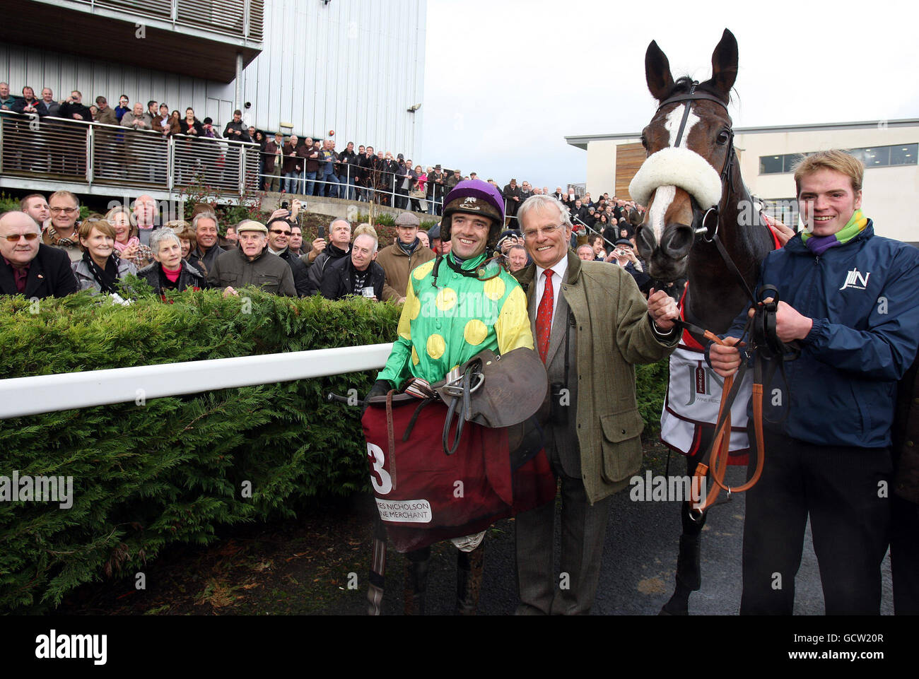 Ruby Walsh celebrates with Clive Smith and Kauto Star after winning the ...