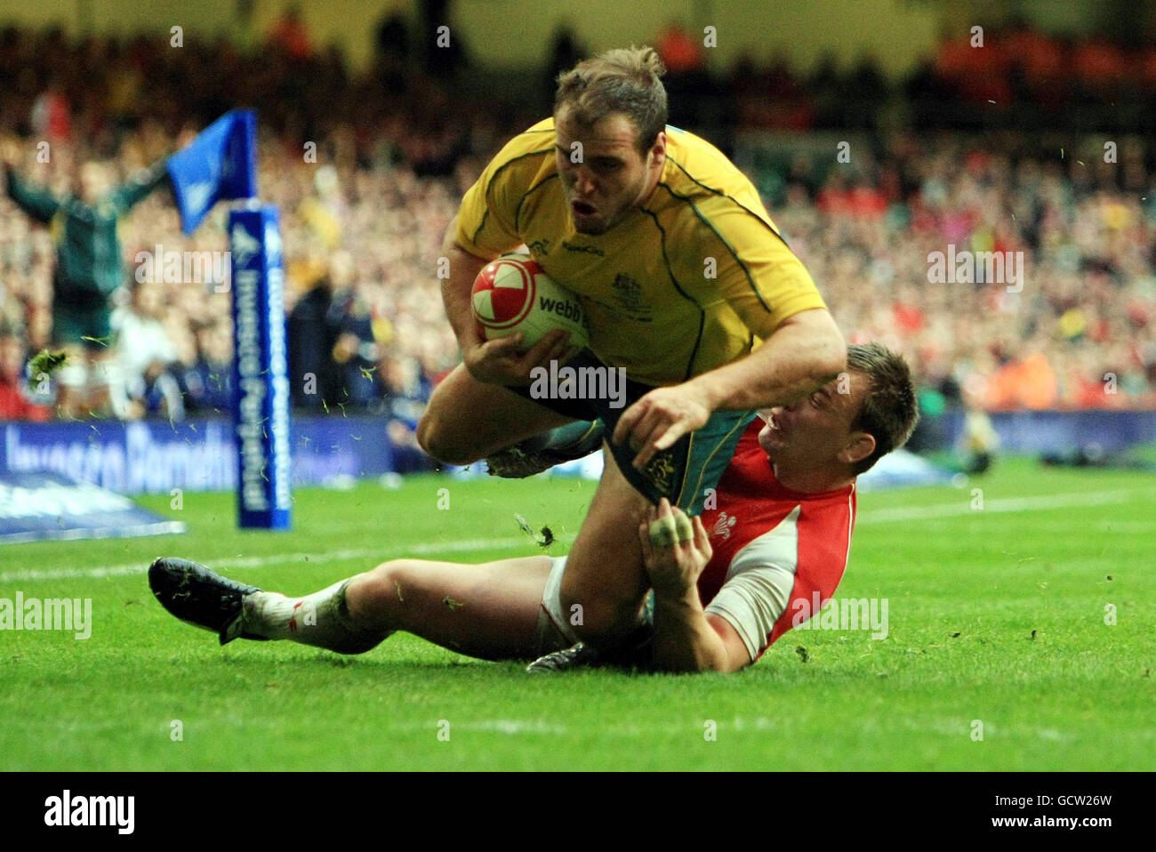 Australia's Ben Alexander crosses for a try during the International ...