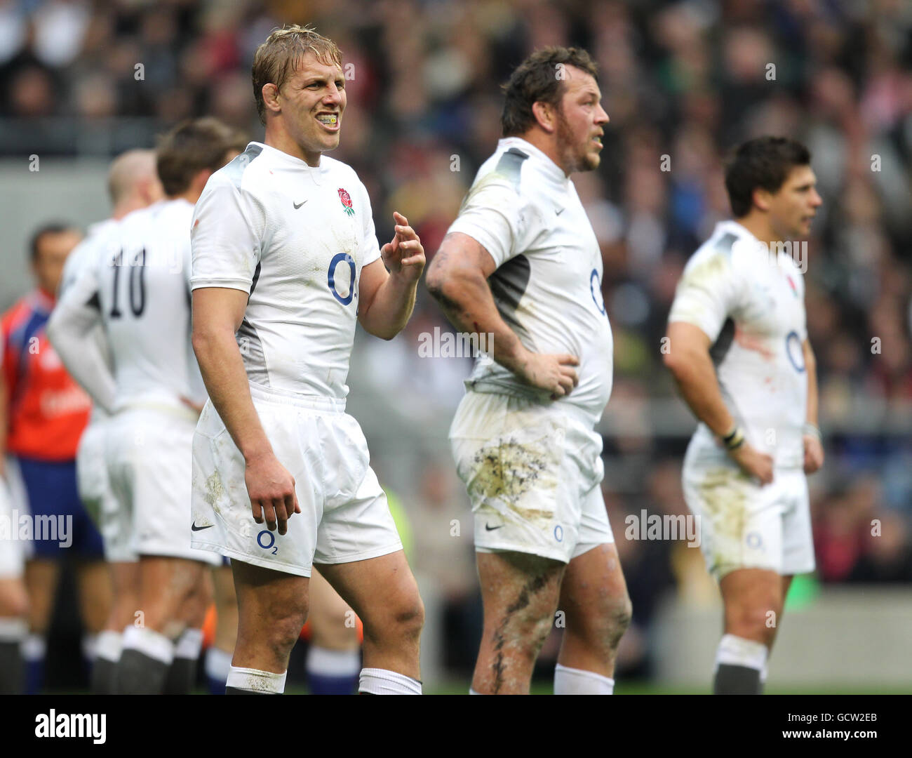 England's captain Lewis Moody stands dejected after New Zealand score a ...