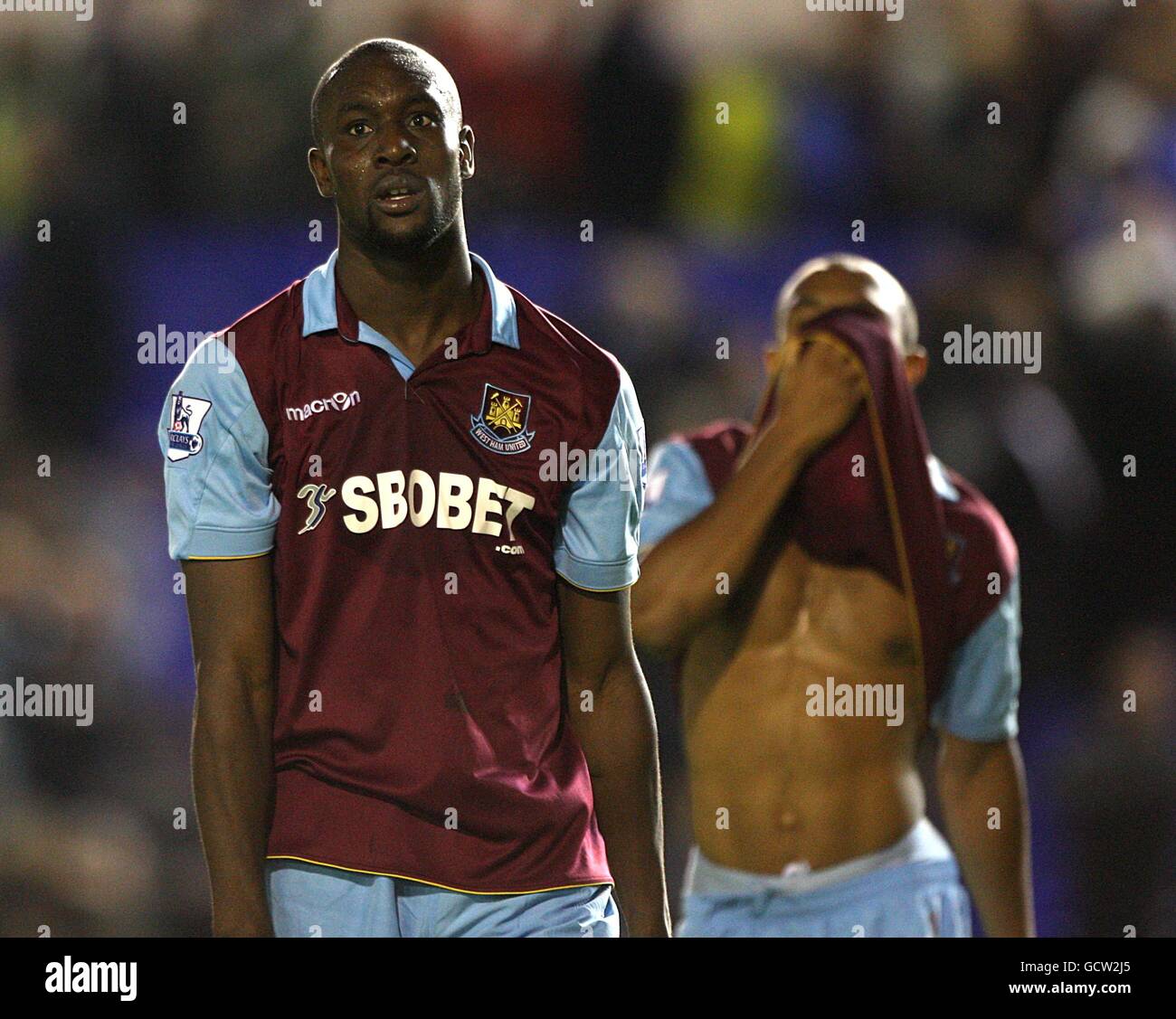 West Ham United's Carlton Cole (left) and Daniel Gabbidon look dejected ...