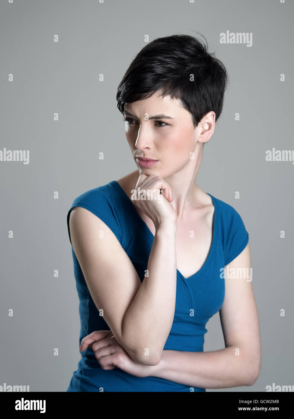 Woman squinting hi-res stock photography and images - Alamy