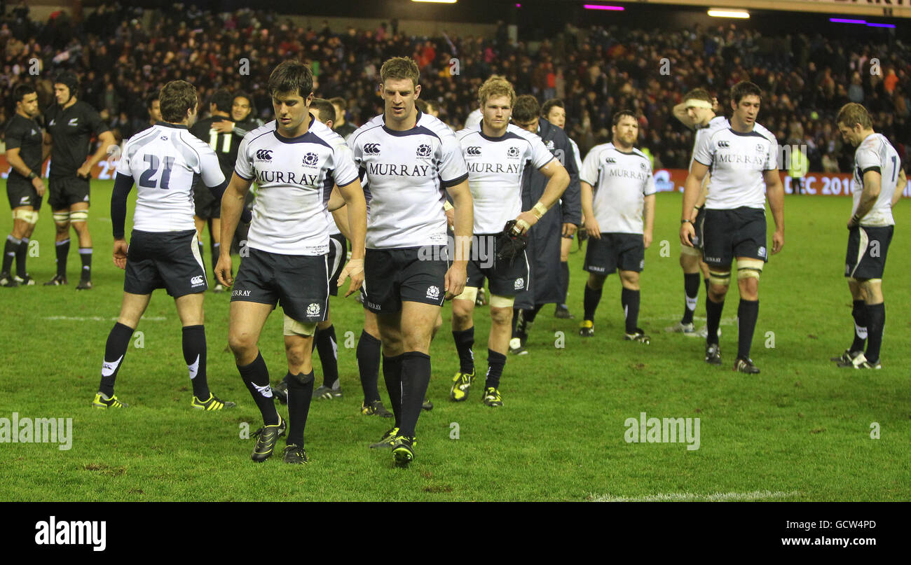 Scotland's players trudge off the field at the final whistle Stock ...
