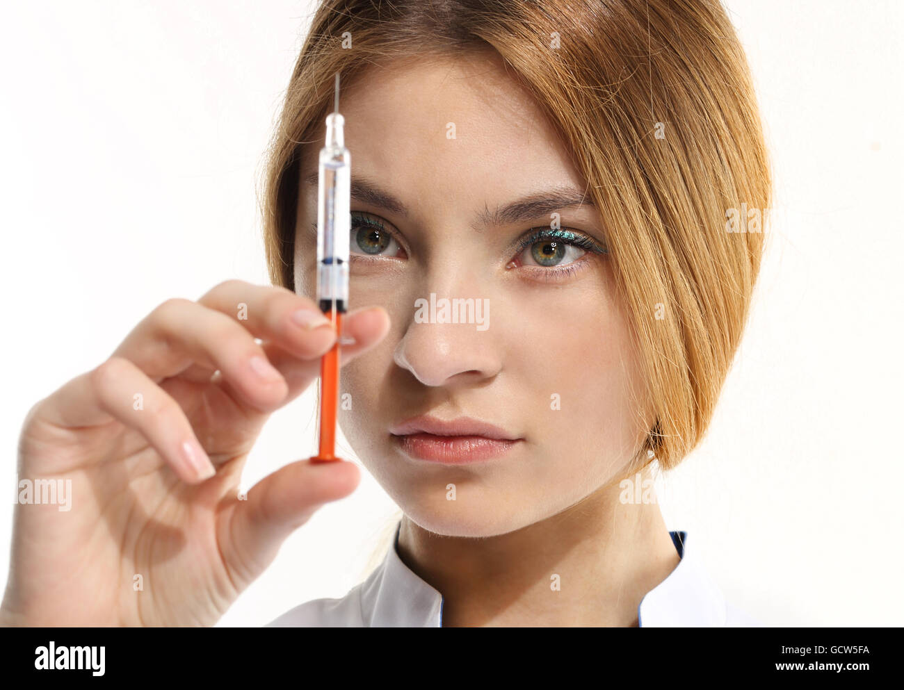 Female doctor with syringe Stock Photo - Alamy