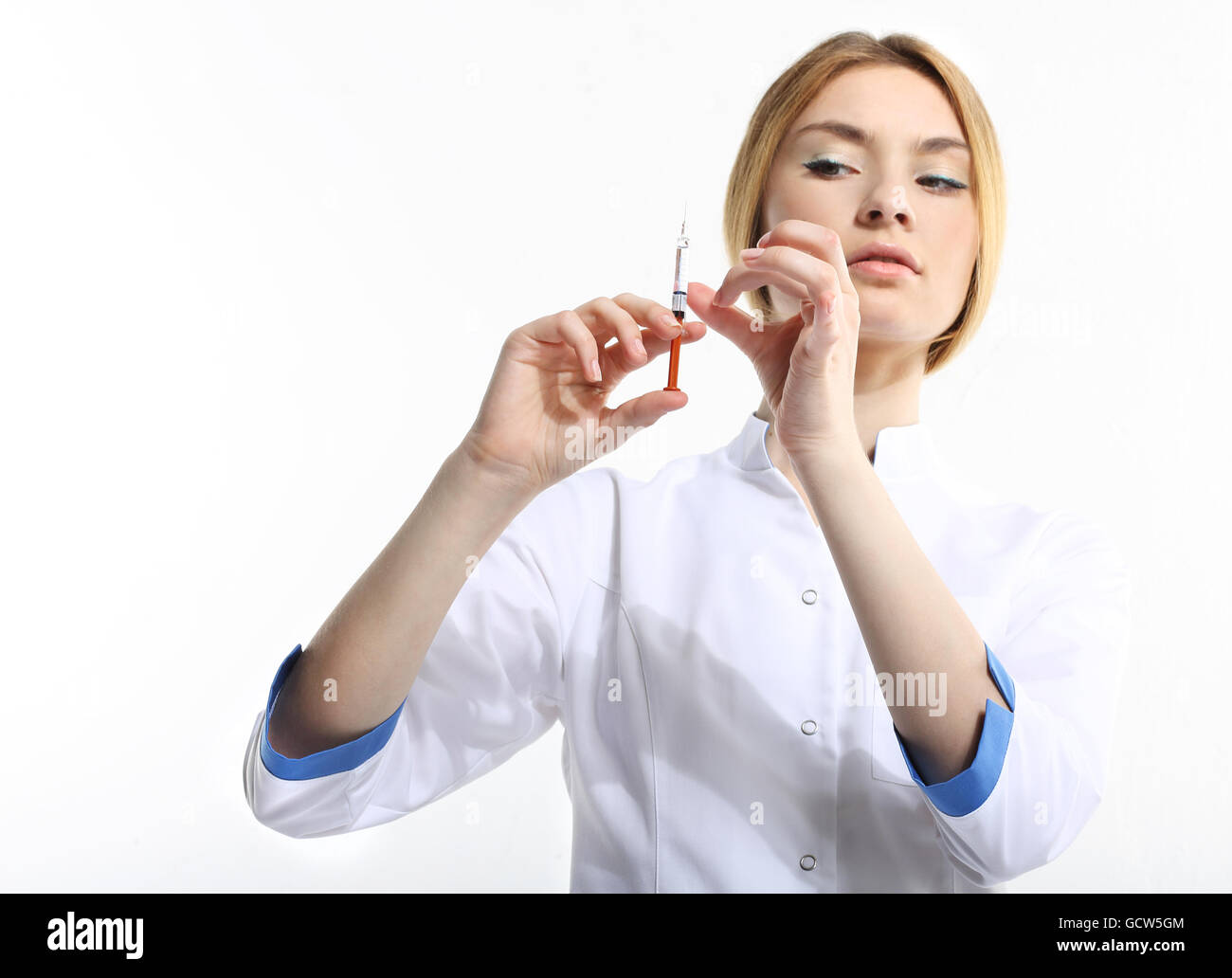 Female doctor with syringe Stock Photo - Alamy