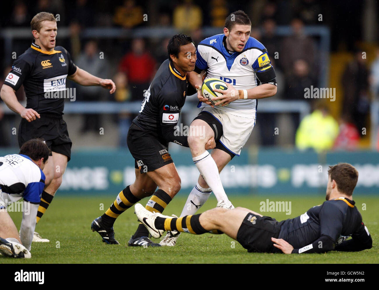 Bath's Jack Cuthbert (centre right) is tackled during the LV=Cup match ...
