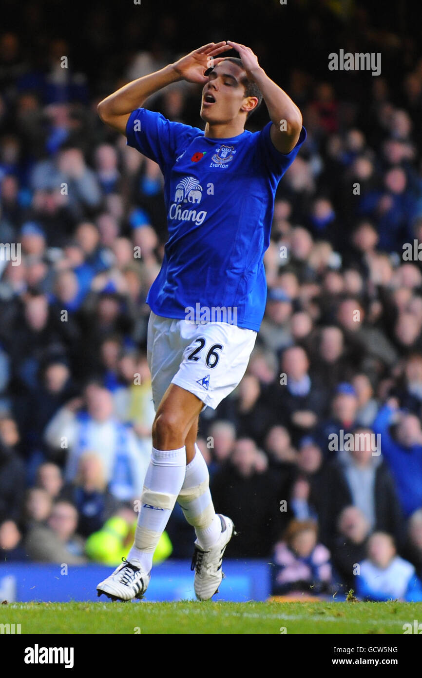 Everton's Jack Rodwell stands dejected after missing a chance on goal ...