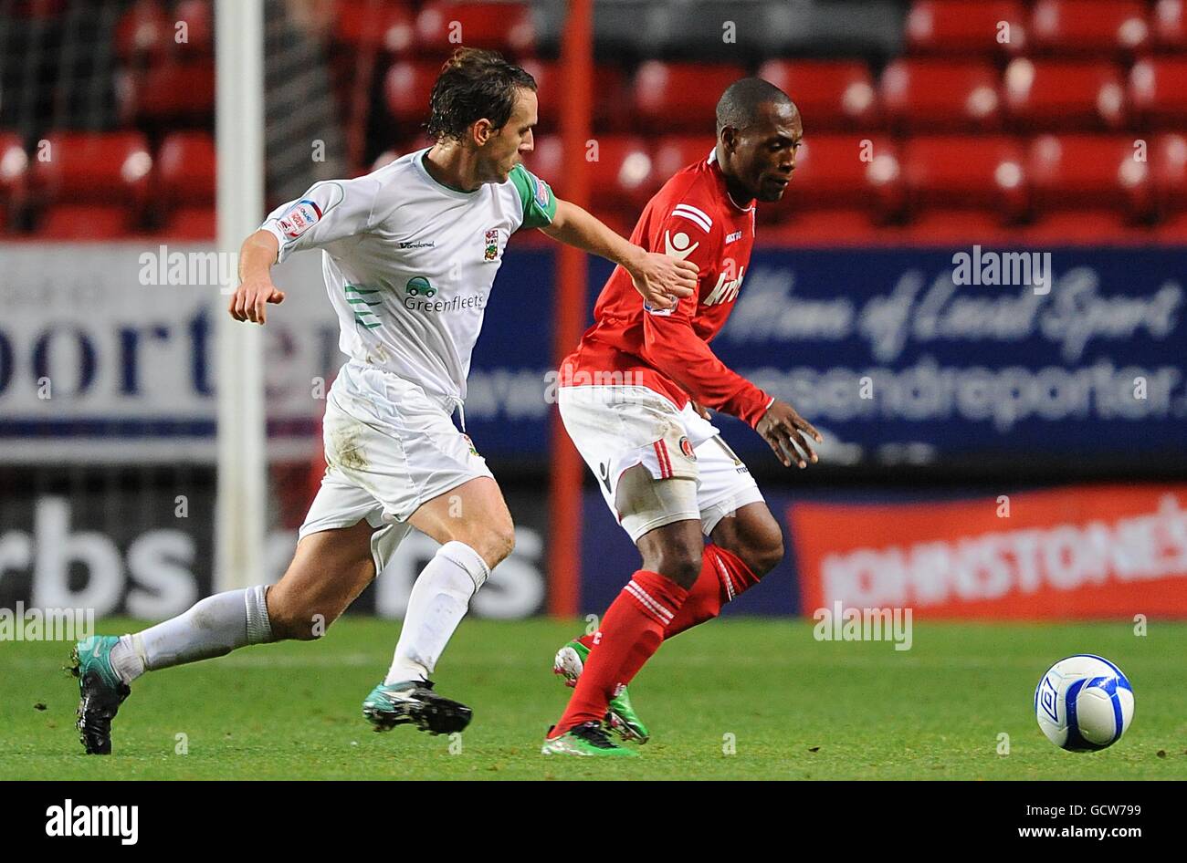 Barnet's Ricky Holmes (left) and Charlton Athletic's Kyel Reid battle ...