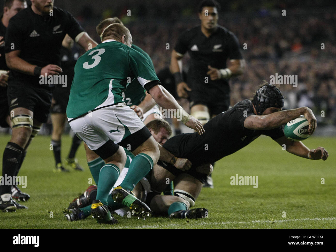 Ireland's Tom Court fails to stop a try from New Zealand's Anthony ...