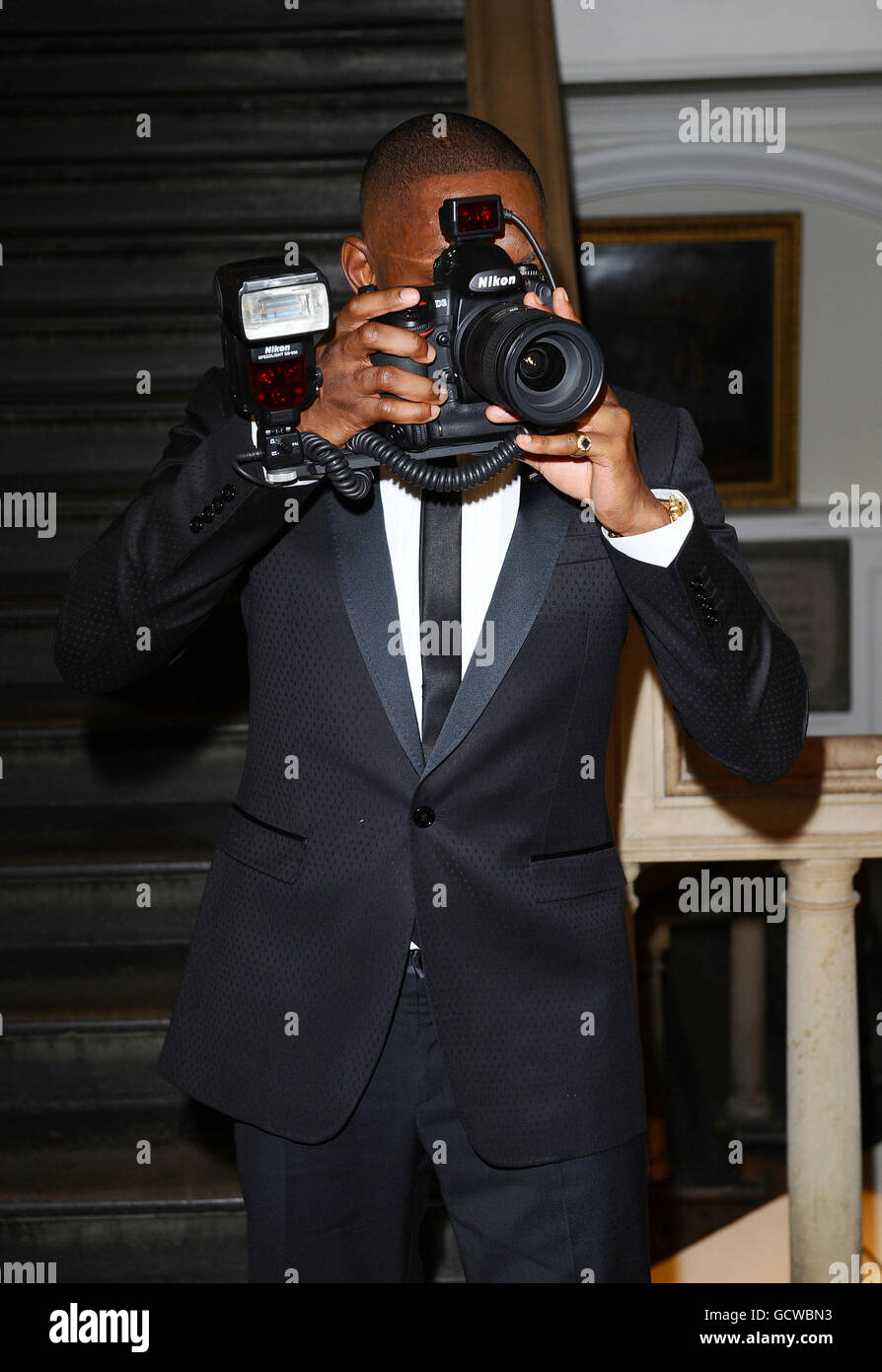 Dizzee Rascal takes a picture after winning the Ultimate Man Of The ...