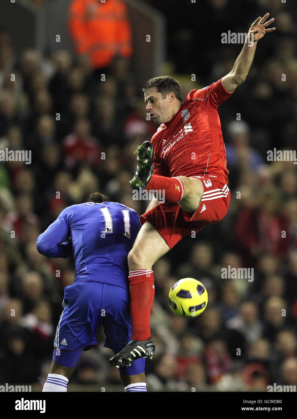 Chelseas didier drogba and liverpools jamie carragher hi-res stock ...