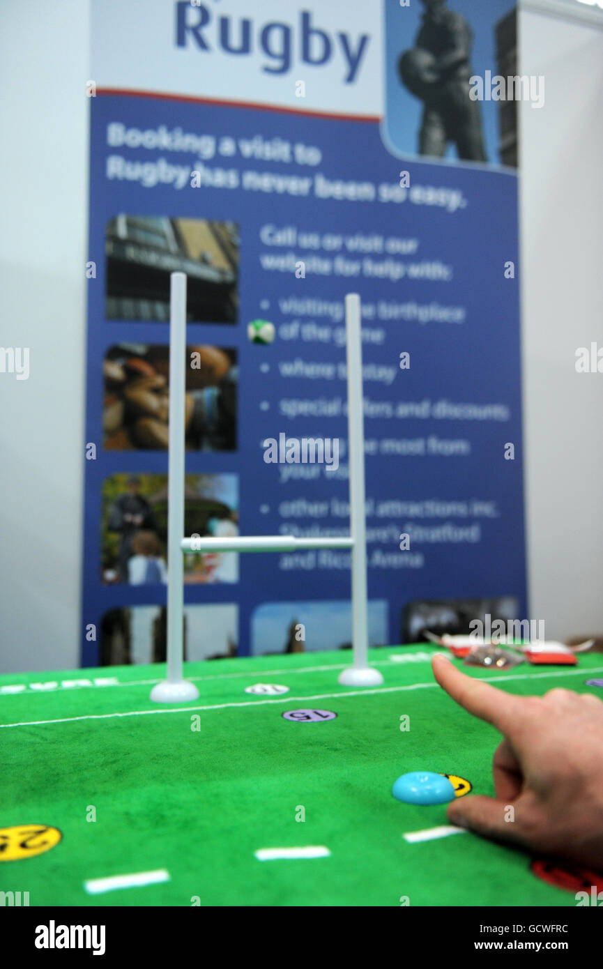 A delegate plays finger rugby at a stall hi-res stock photography and ...