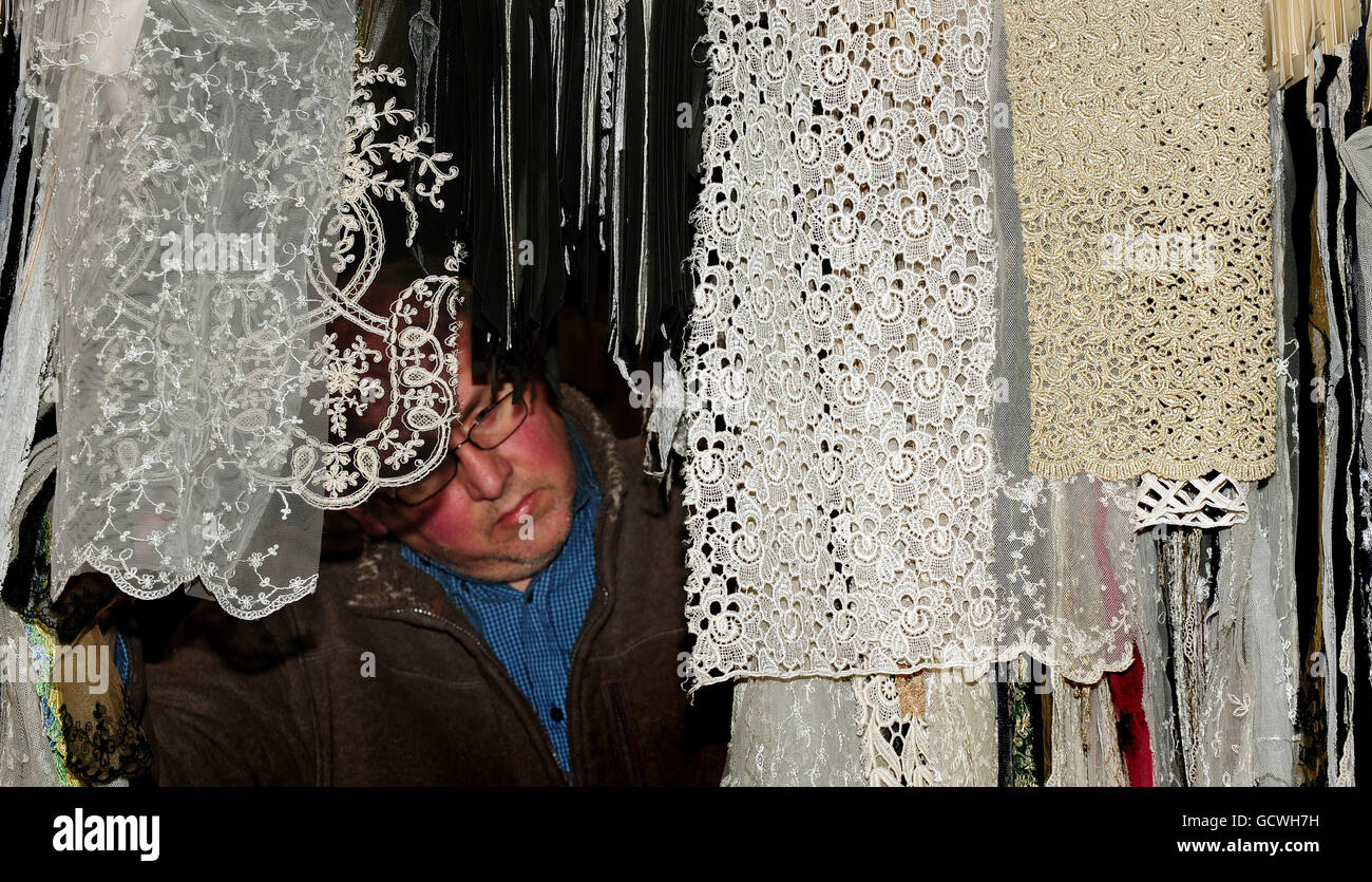 Partner Matthew Watson of Roger Watson Lace in Nottingham looks at lace ...