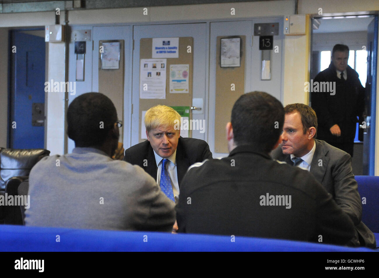 London Mayor Boris Johnson (centre left) and Policing and Criminal ...