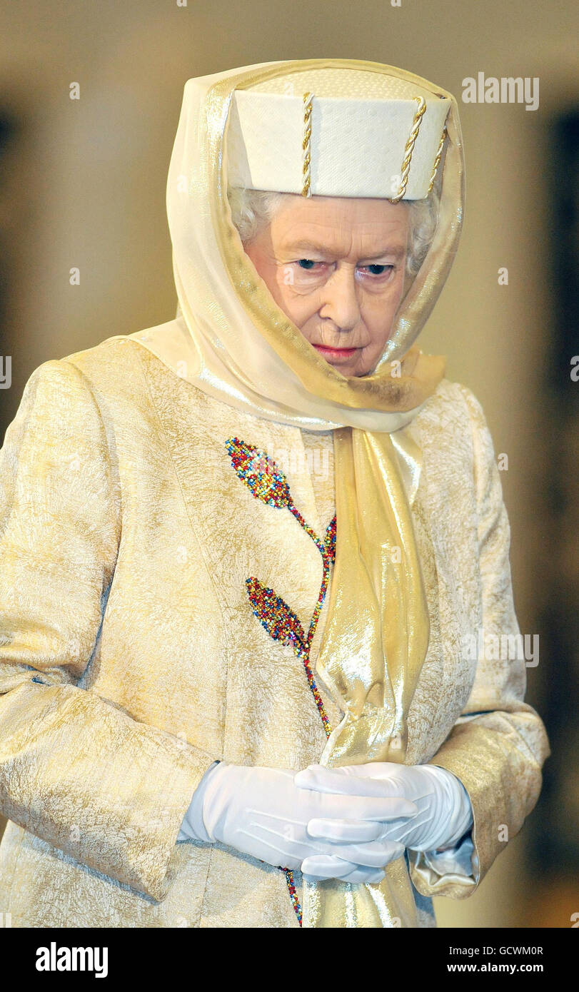 Britain's Queen Elizabeth II, walks through the Sheikh Zayed Grand ...