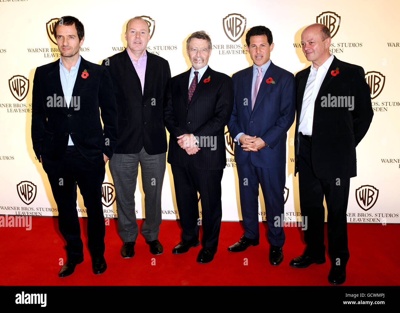 Barry Meyer, Josh Berger and Roy Button arrive for a reception to ...