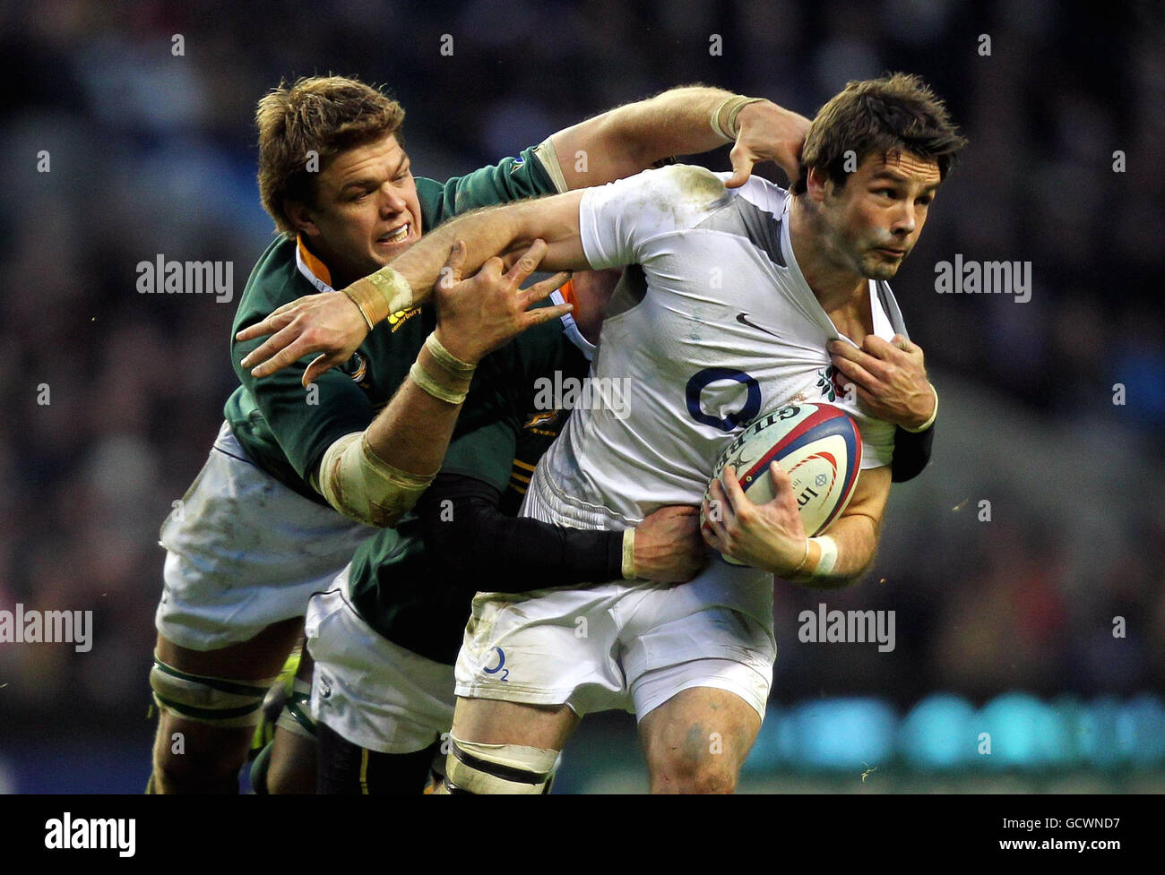 England's Ben Foden is tackled by South Africa Juan Smith and Ruan ...