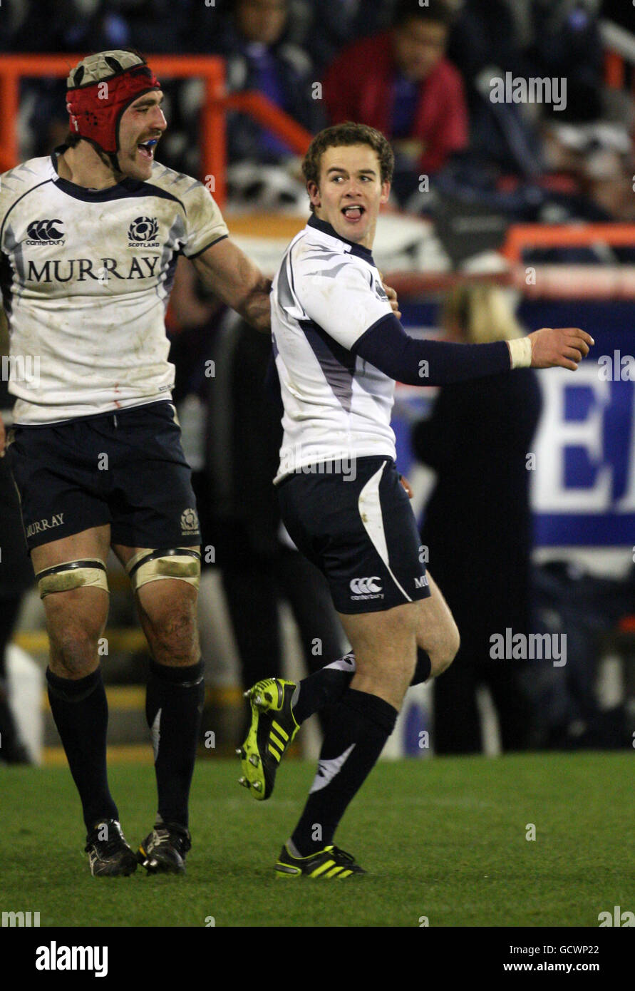 Scotland's Ruaridh Jackson celebrates the winning penalty with Kelly ...