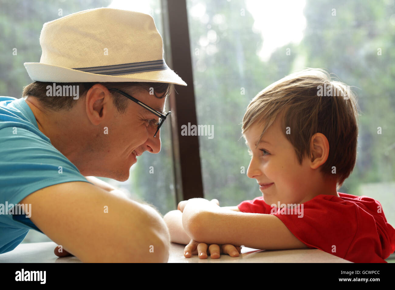 relationship between father and son - family happiness Stock Photo - Alamy