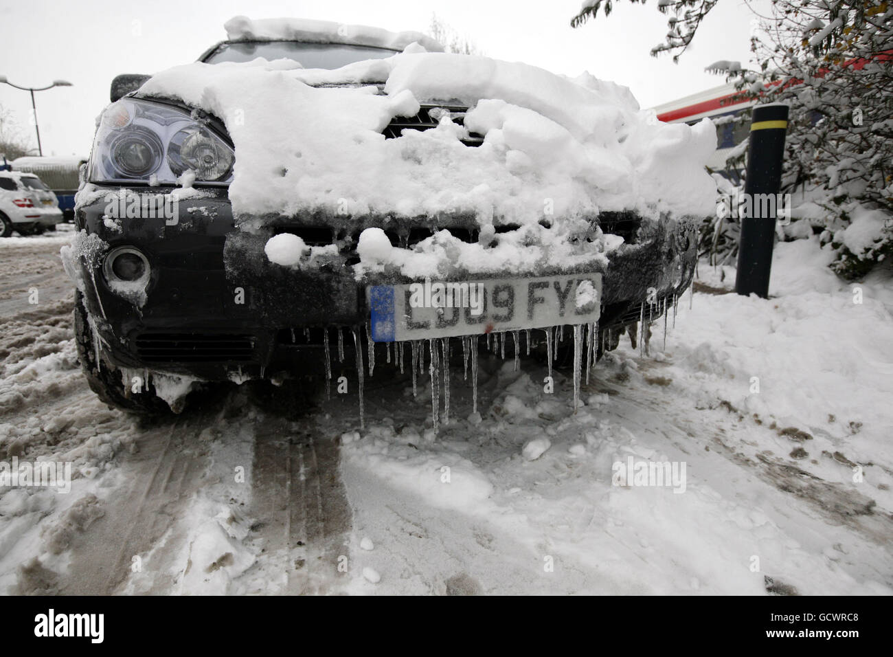 An iced over car in Horley, Surrey as snow and freezing conditions ...