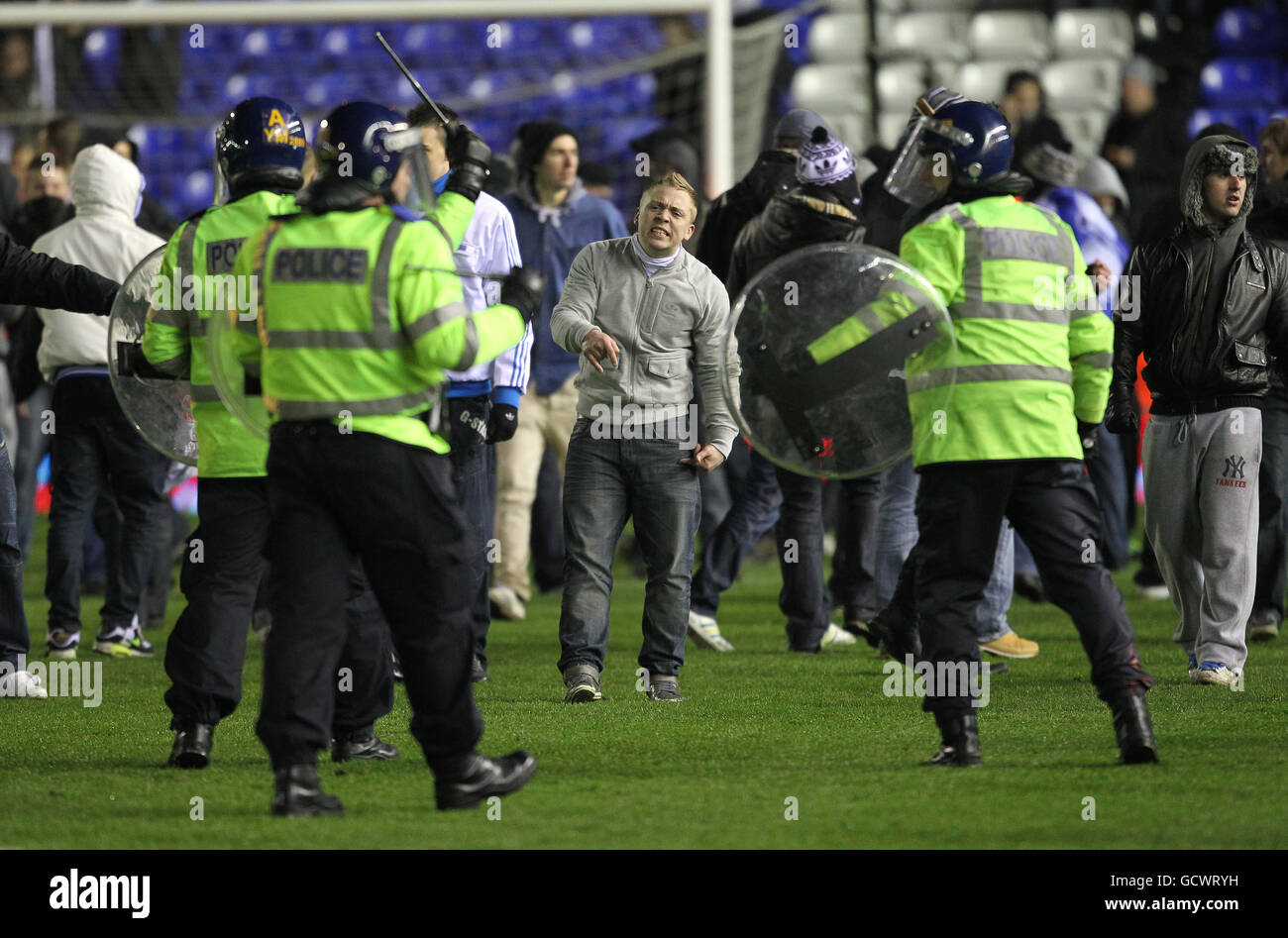 Riot Police push back Birmingham City fans as they invade the pitch ...
