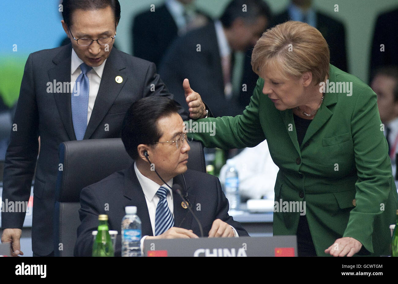 German Chancellor Angela Merkel (right) talks with Chinese President Hu ...