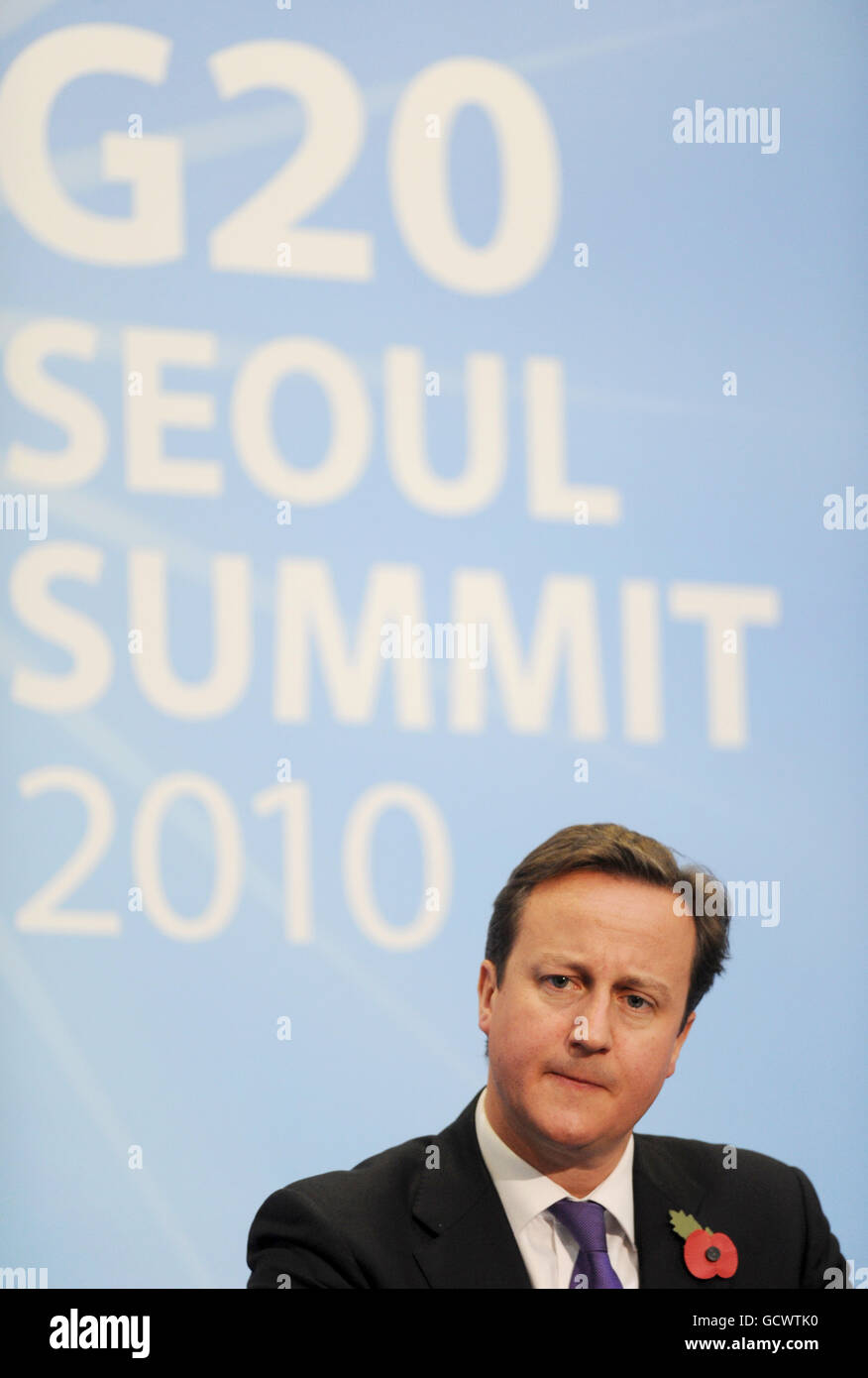 Prime Minister David Cameron holds a news conference after a meeting at ...