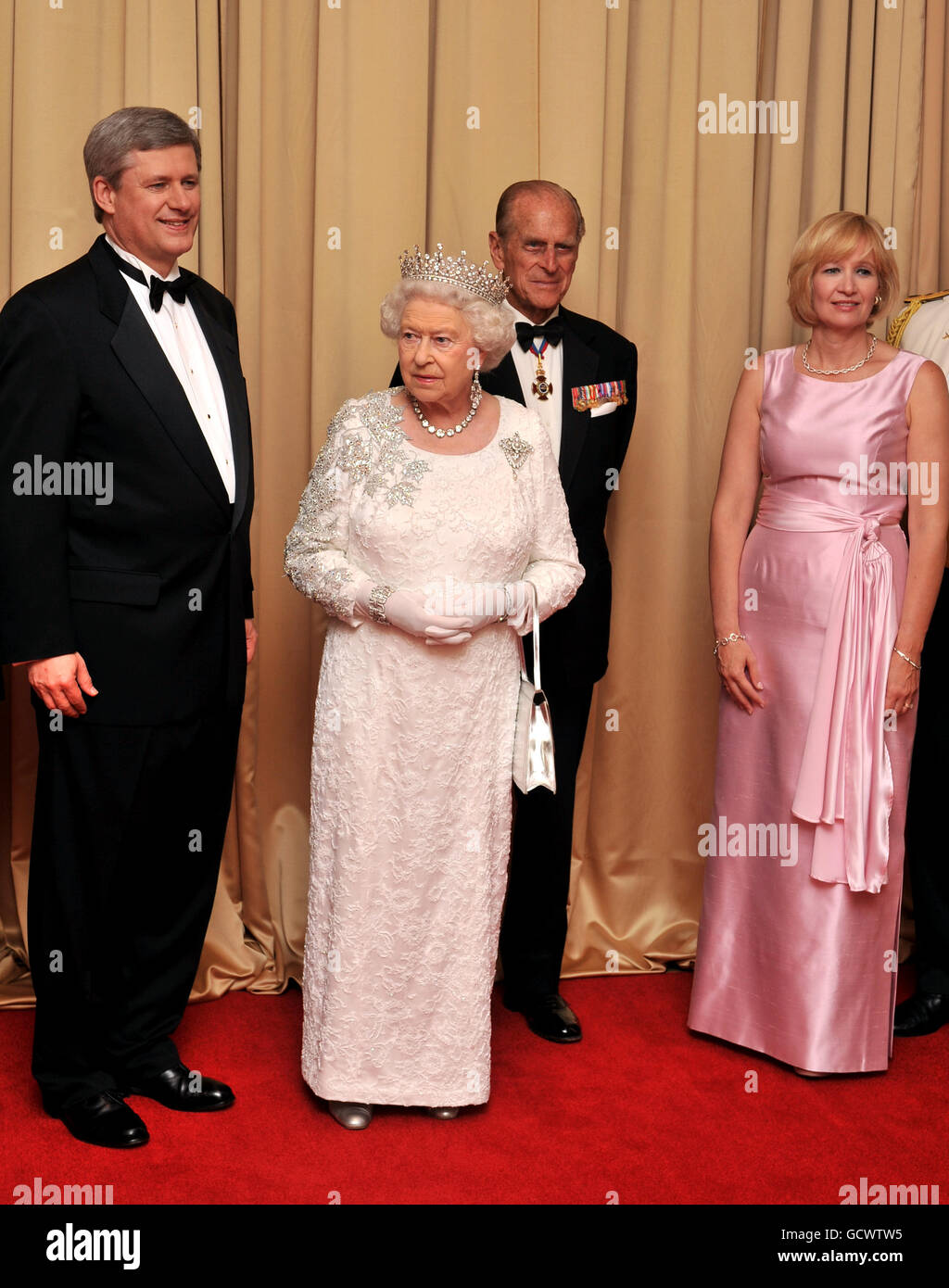 Queen Elizabeth II waits with Canadian PM Stephen Harper (left), the ...