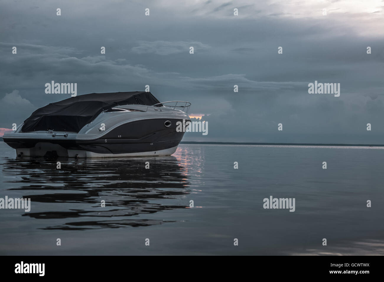 gloomy landscape with the boat Stock Photo - Alamy