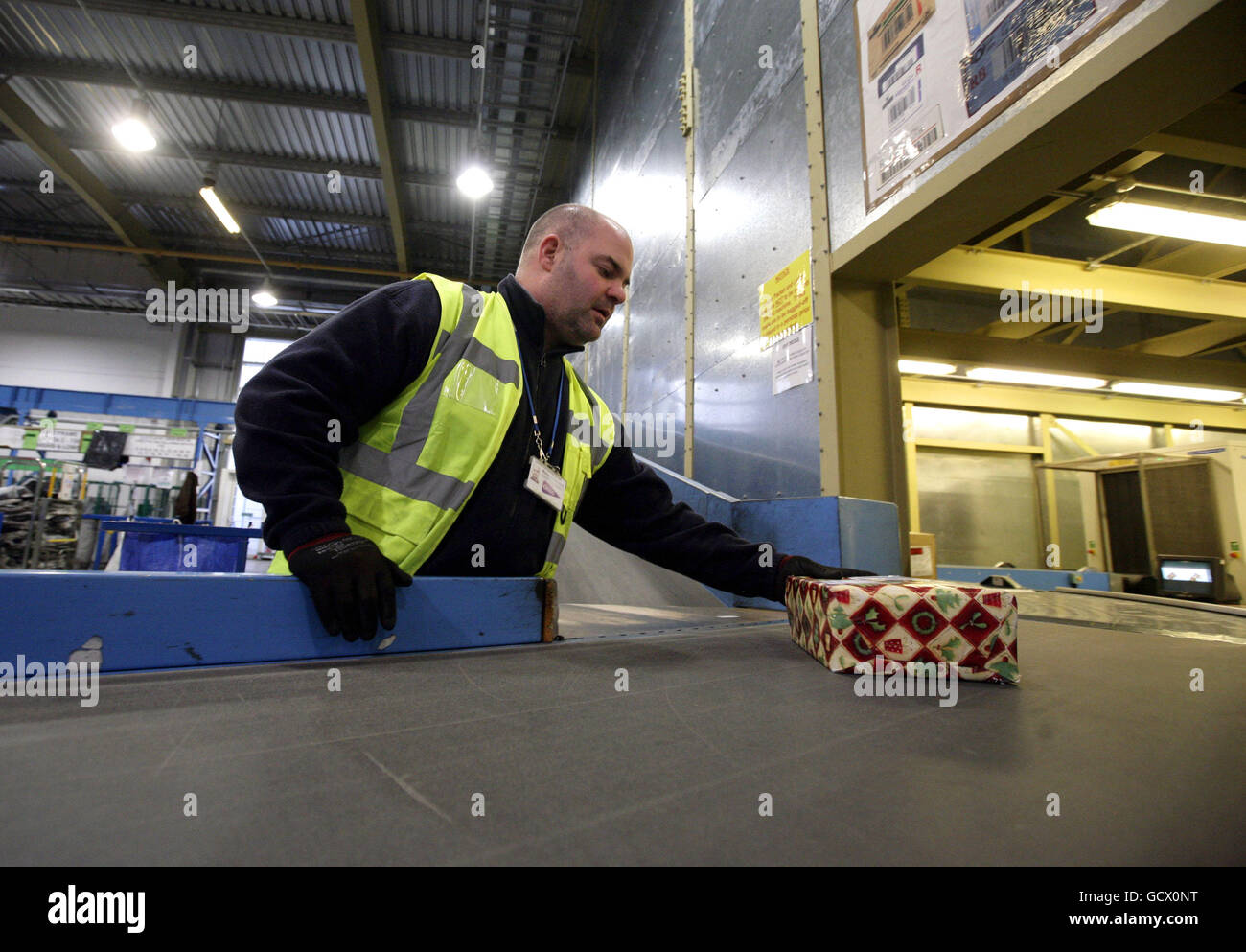 A worker in the post room at The British Forces Post office at RAF ...