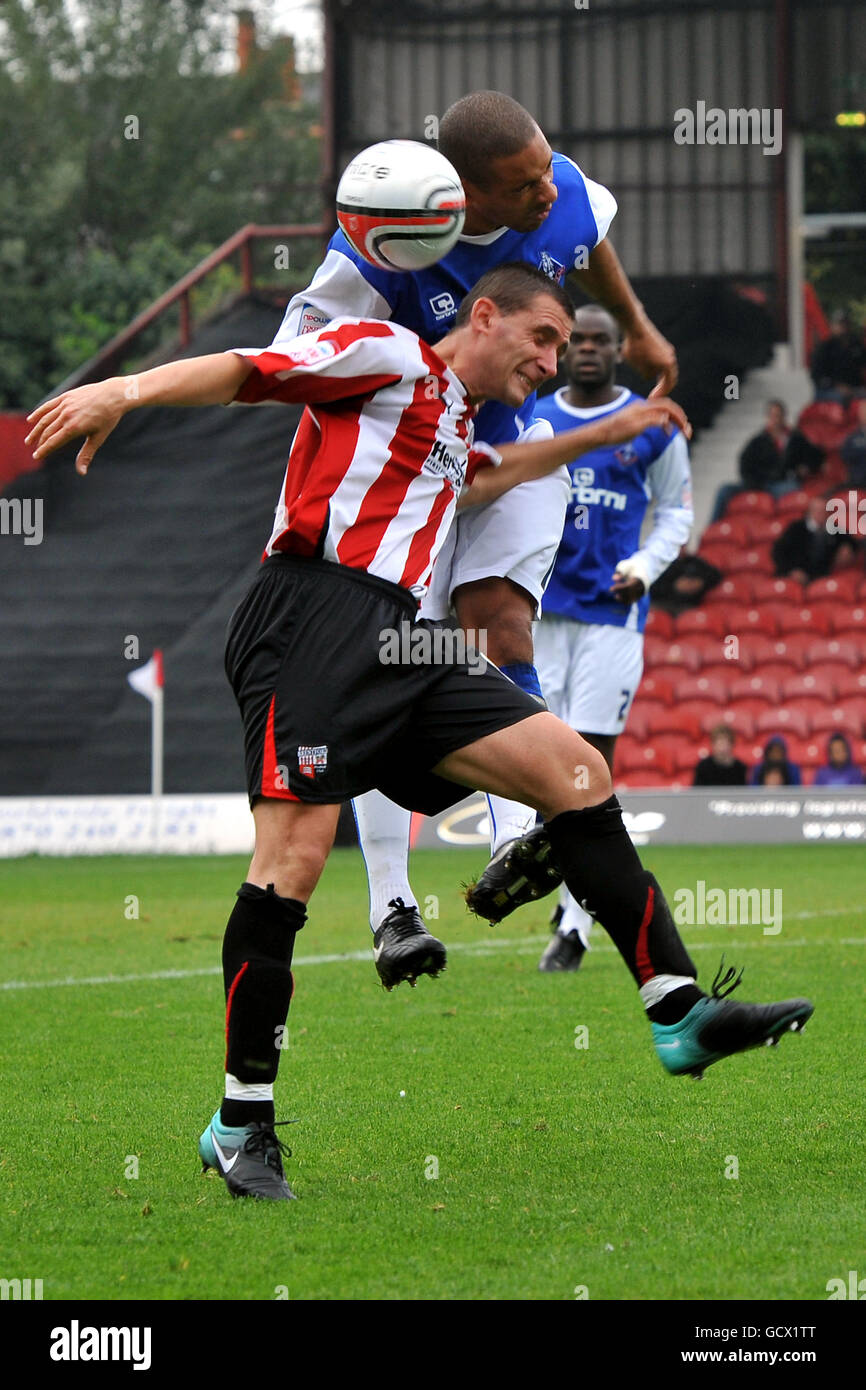 Brentford's Nicky Forster (left) and Oldham Athletic's Jason Jarrett ...