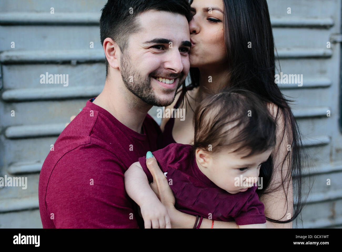 young family with a child Stock Photo - Alamy