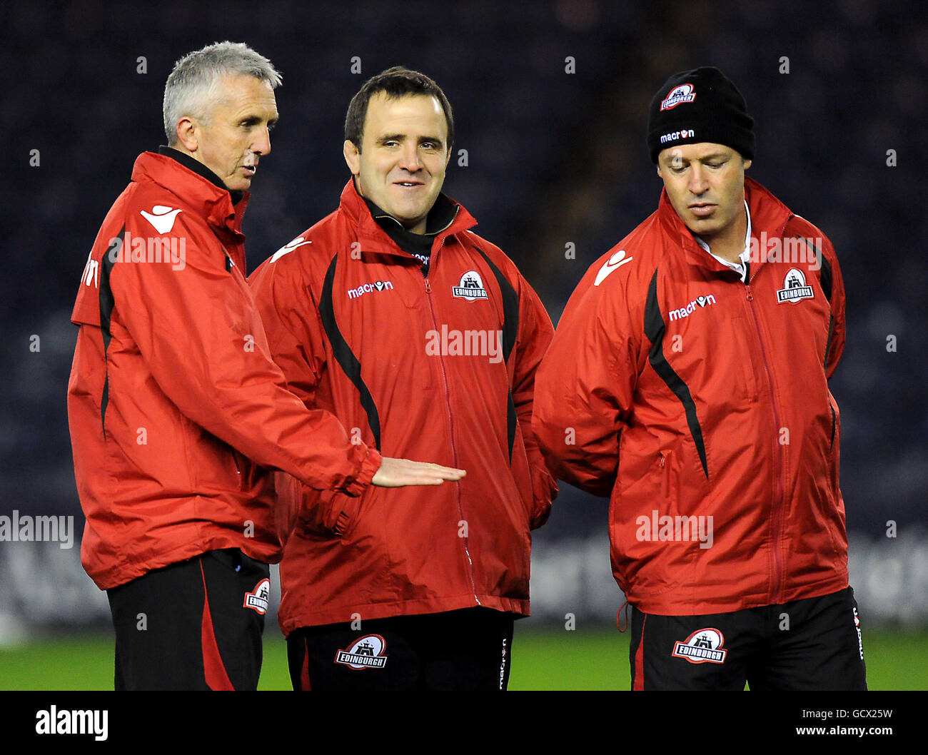Rob Moffat, Edinburgh Head Coach (left) speaks to his staff Stock Photo ...