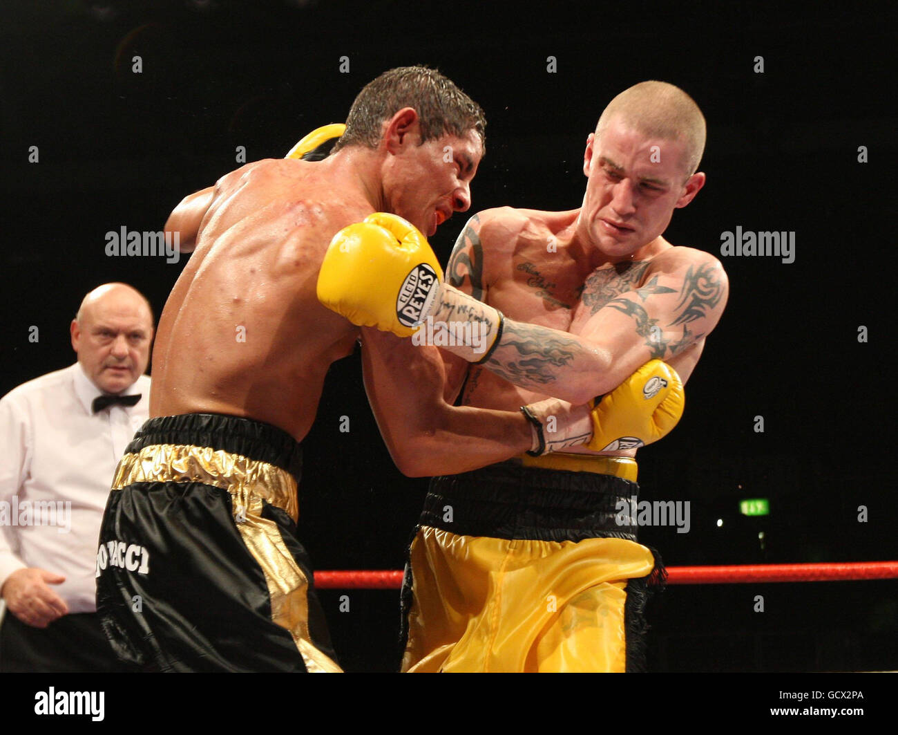 Ricky Burns (right) and Andreas Evensen during the WBO Super-Featherweight Championship bout at ...
