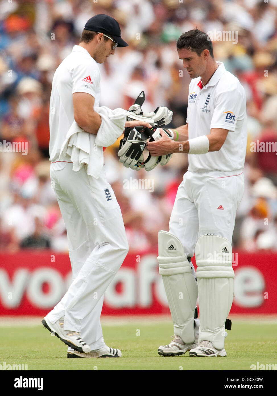 England's Kevin Pietersen with 12th man Chris Tremlett during the ...