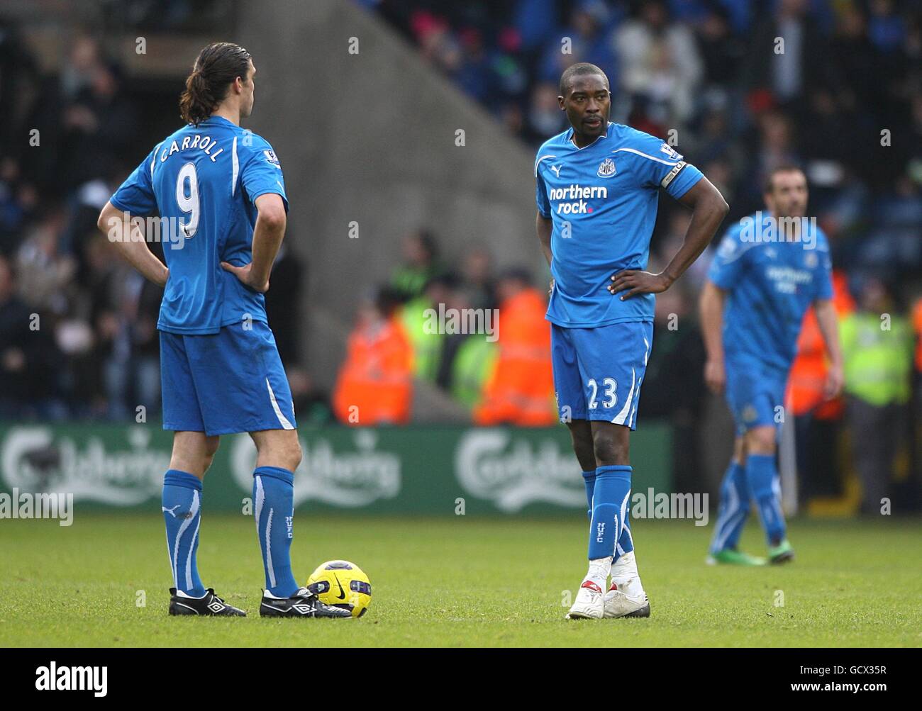 Newcastle United's Andrew Carroll (left) and Sol Campbell (right) stand ...