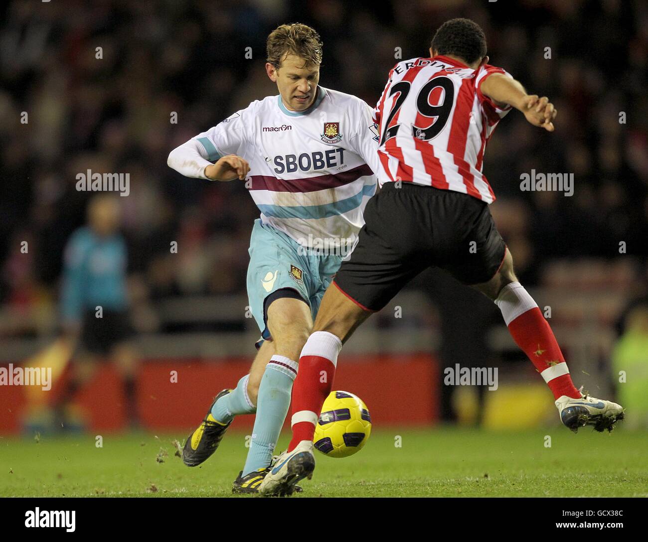 West Ham United's Jonathan Spector (left) and Sunderland's Anton ...