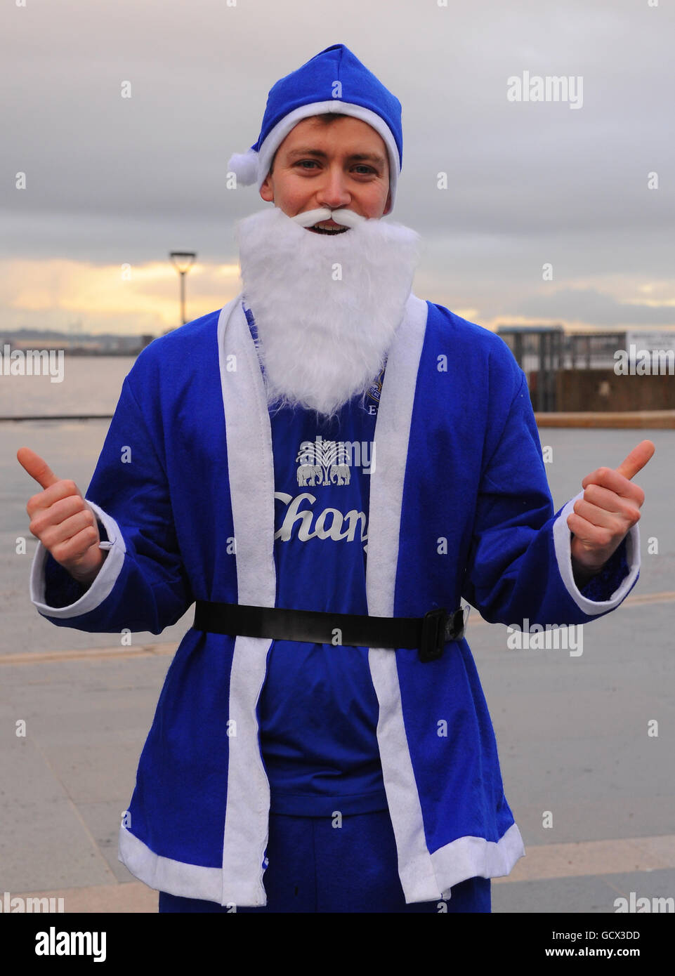 Blue Santa's pose for a photograph prior to the annual 5km Liverpool ...