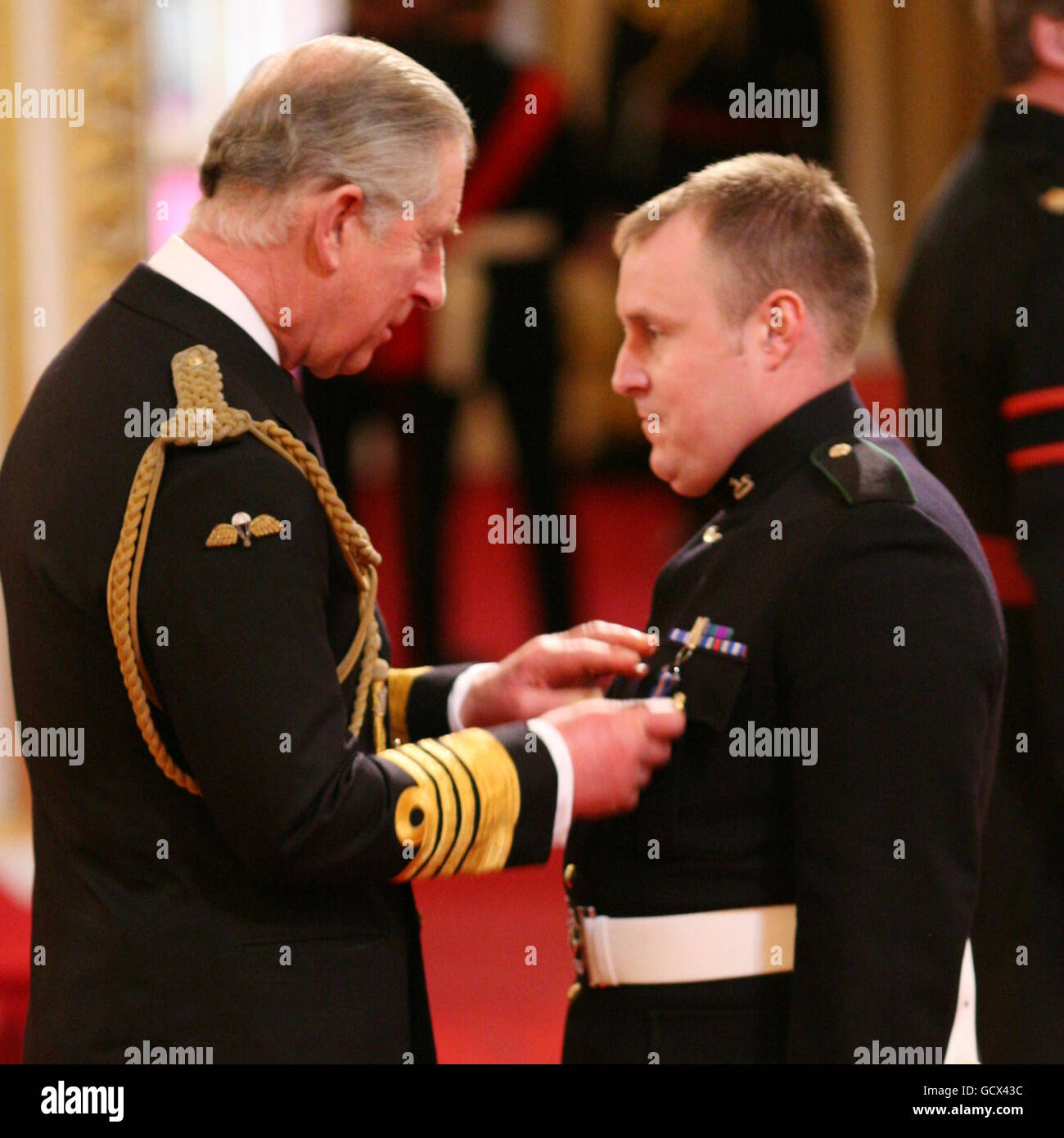 Corporal John Hardman, from The Yorkshire Regiment receives the Queen's ...