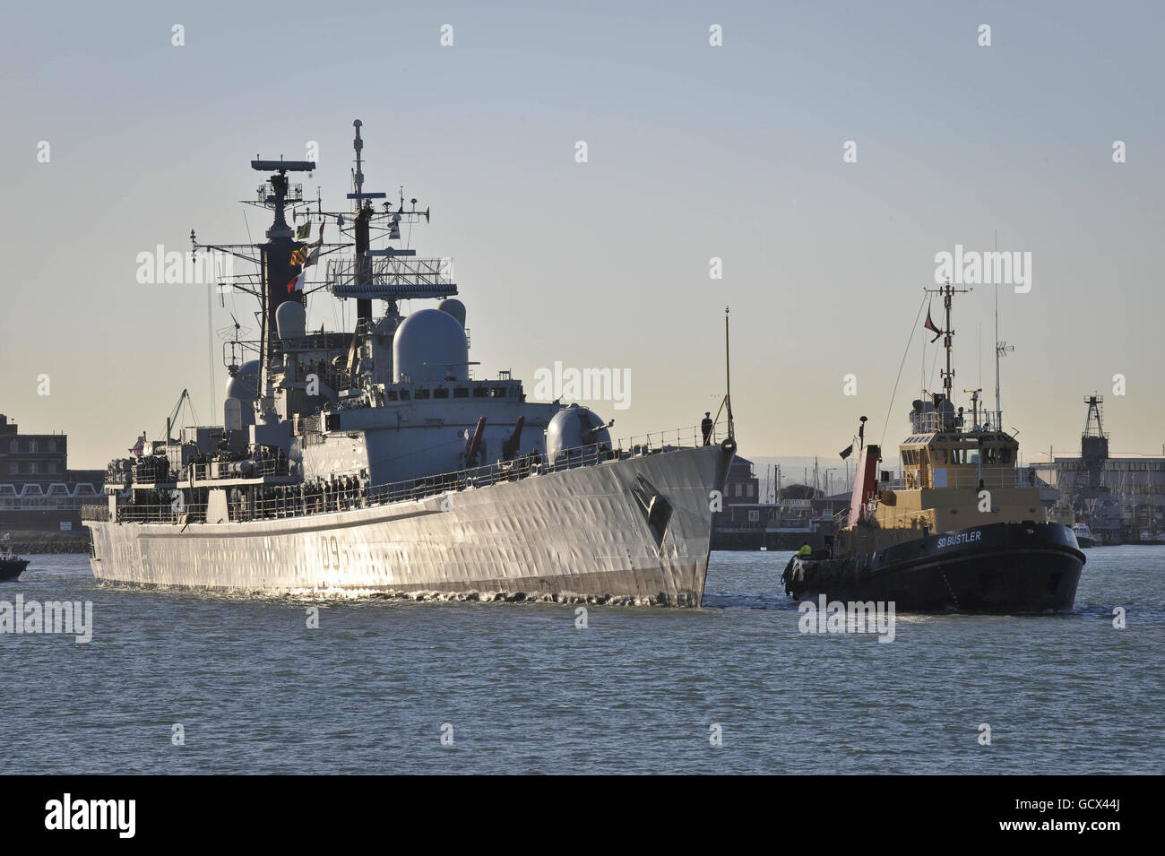 Tug boat and war ship hi-res stock photography and images - Alamy