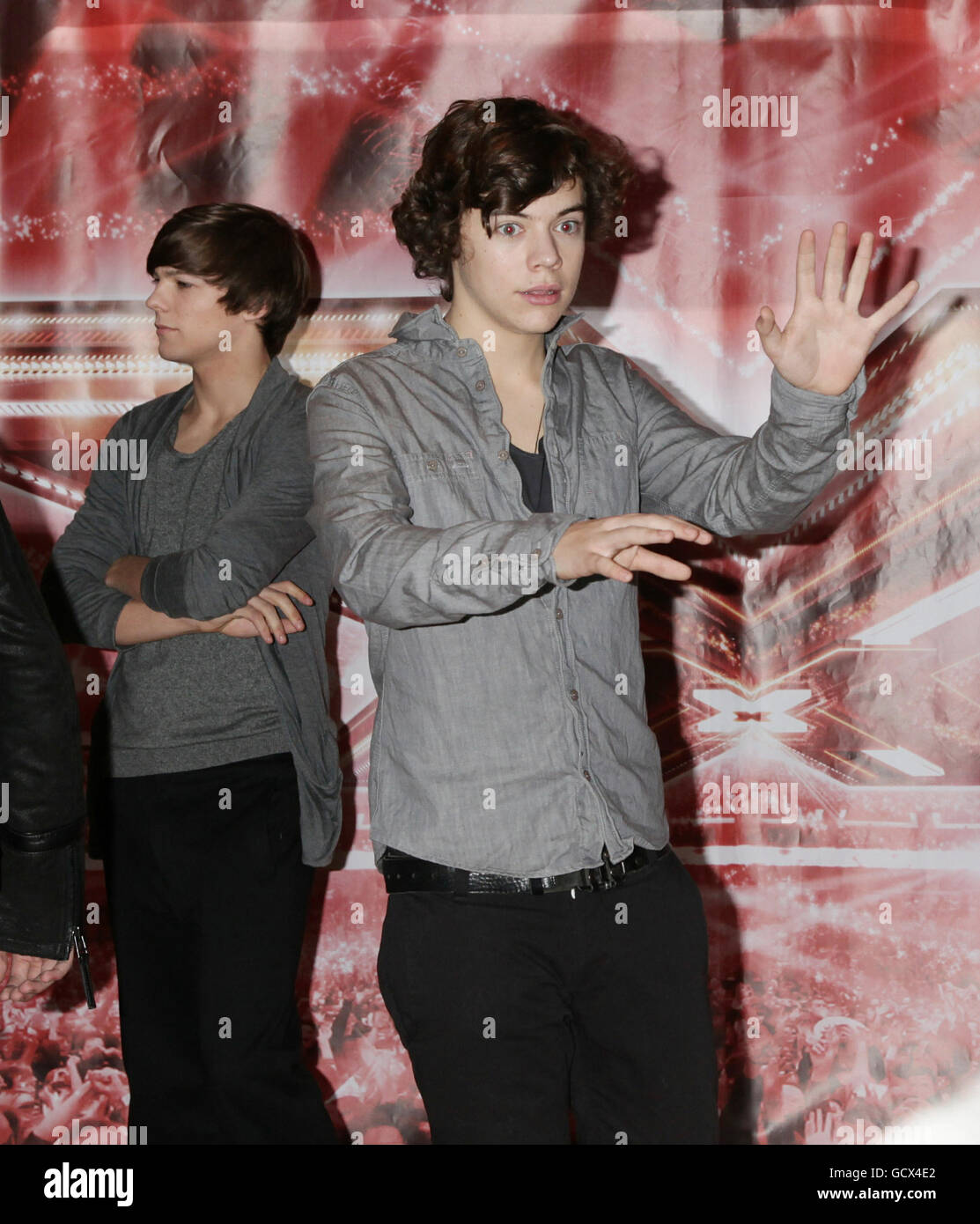 One Direction members Louis Tomlinson (left) and Harry Styles attending ...