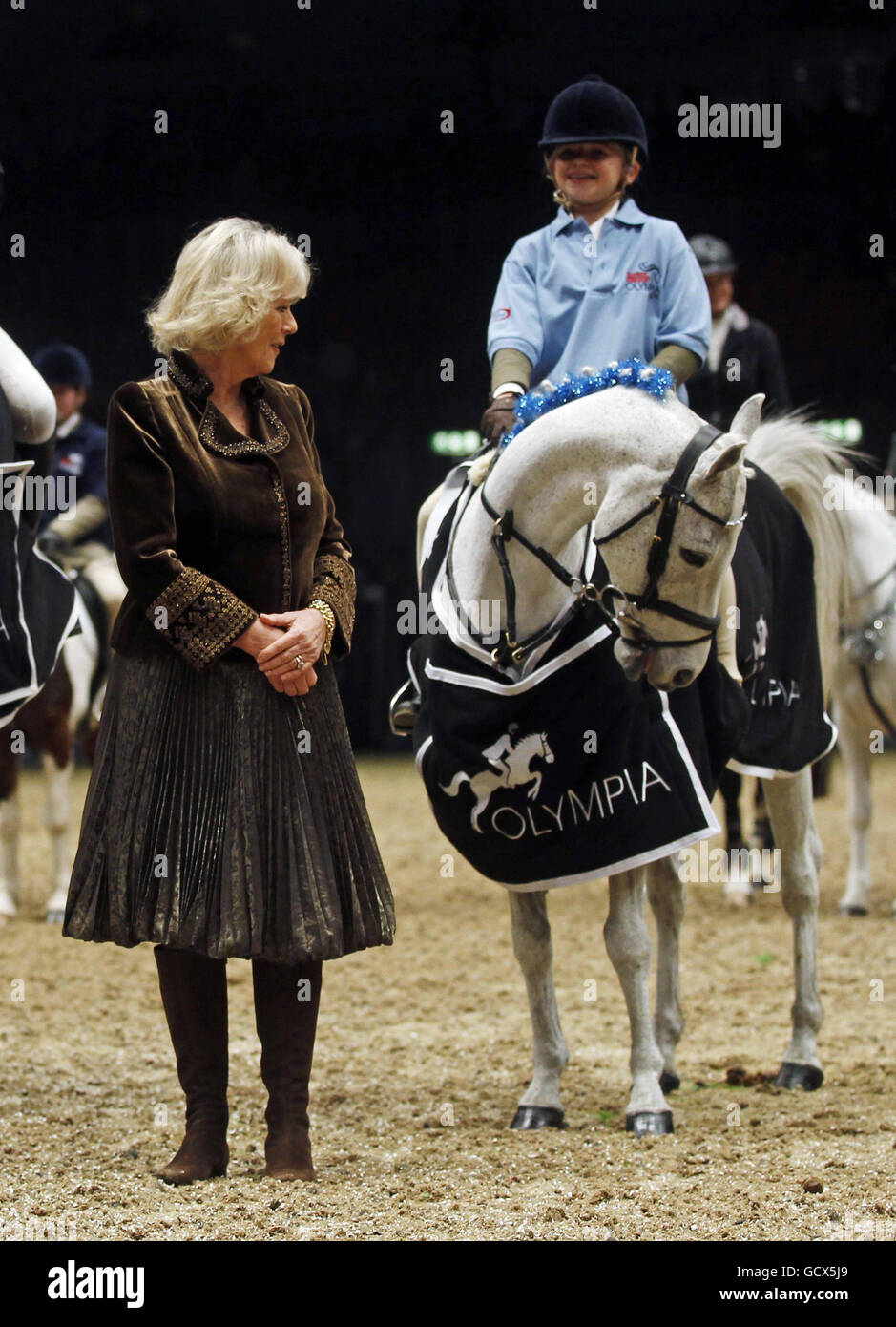 The Duchess of Cornwall talks to Phoebe Locke, who won The Pony Club ...